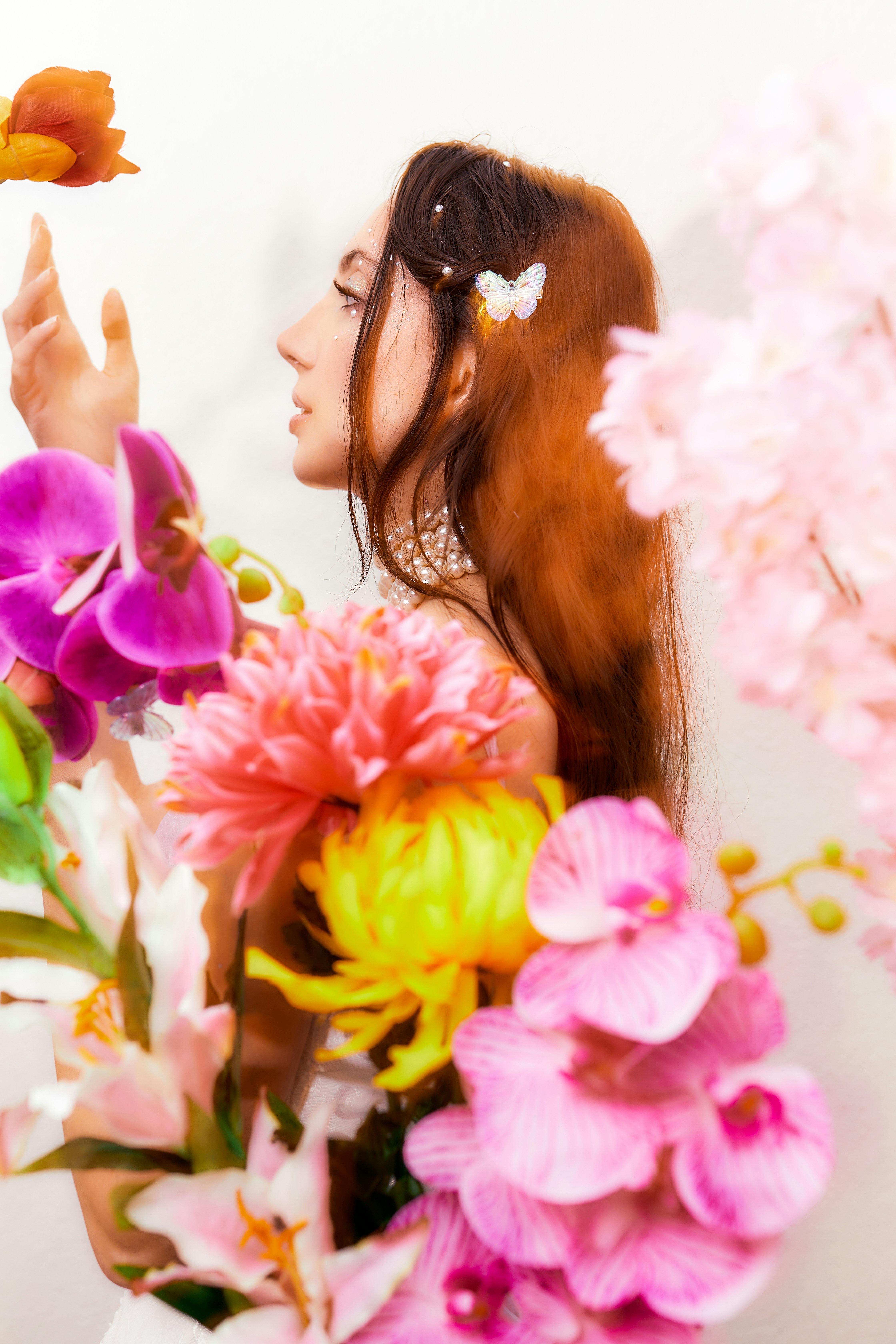 Silk and Petals: A Side-Profile Framed by a Colorful Bloom Garden