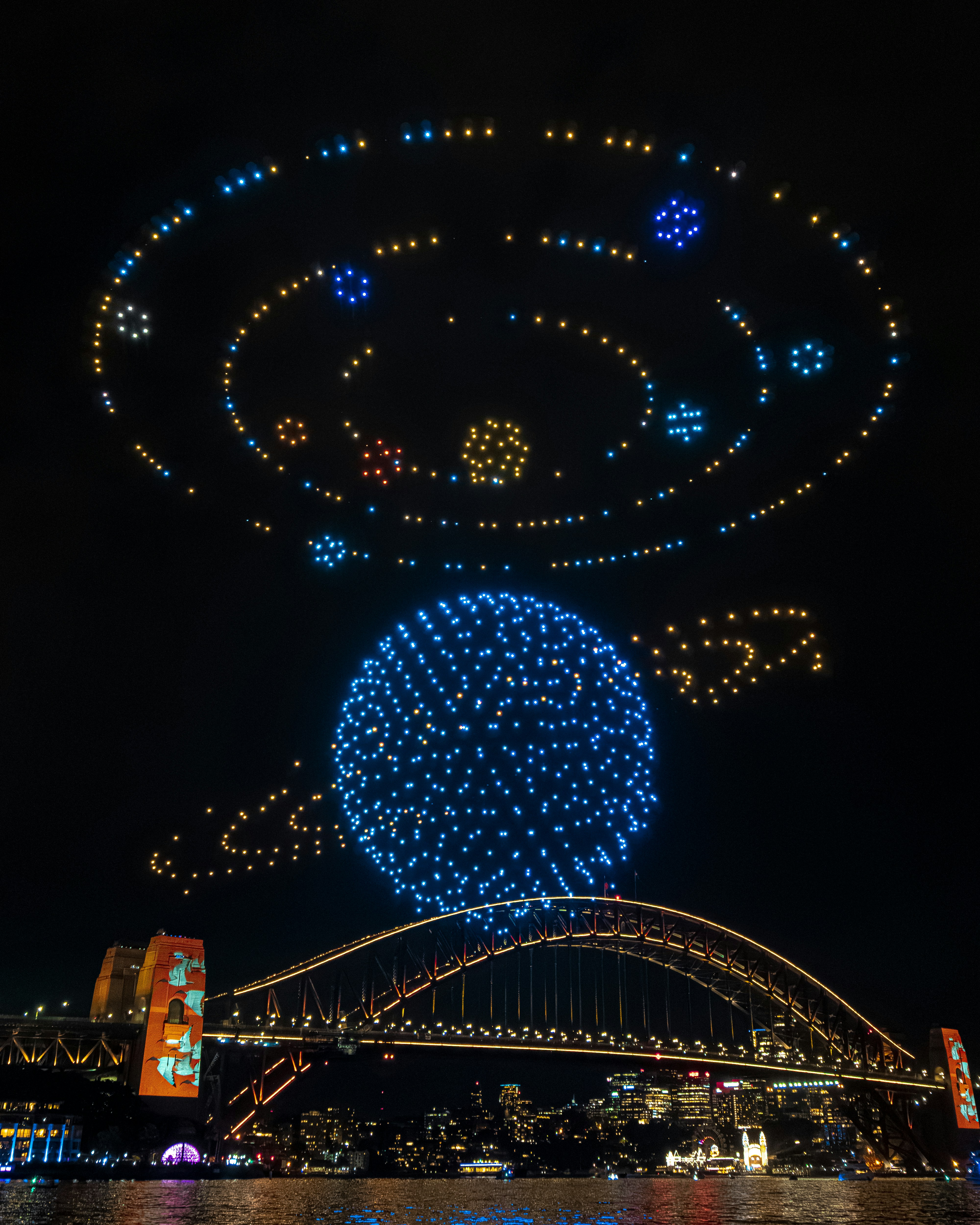 Blue LED Orb over the Harbour Bridge: a night-neon constellation above Sydney