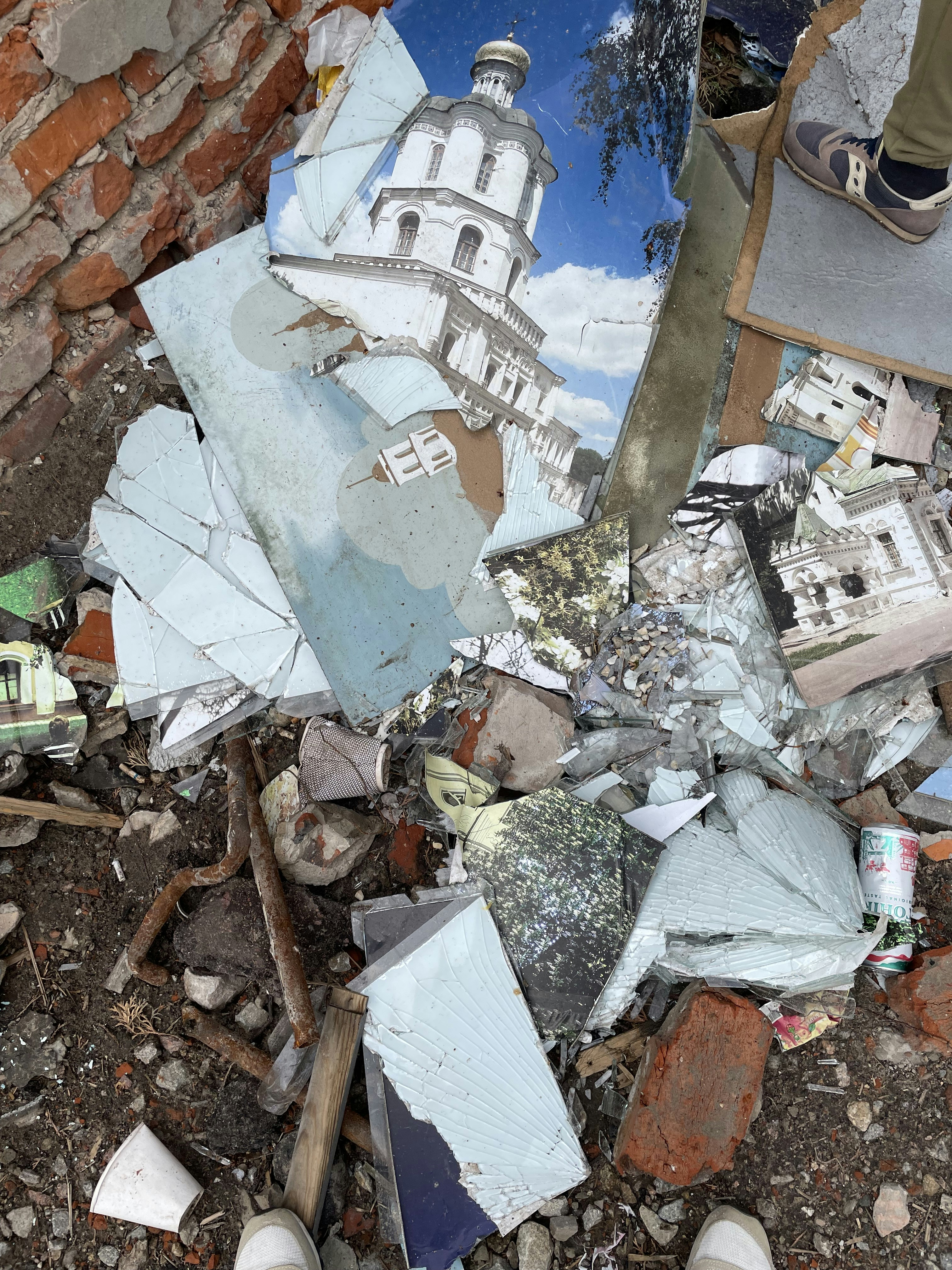 Fragmented Architecture: Collage of Broken Posters in a Crumbled Scatter
