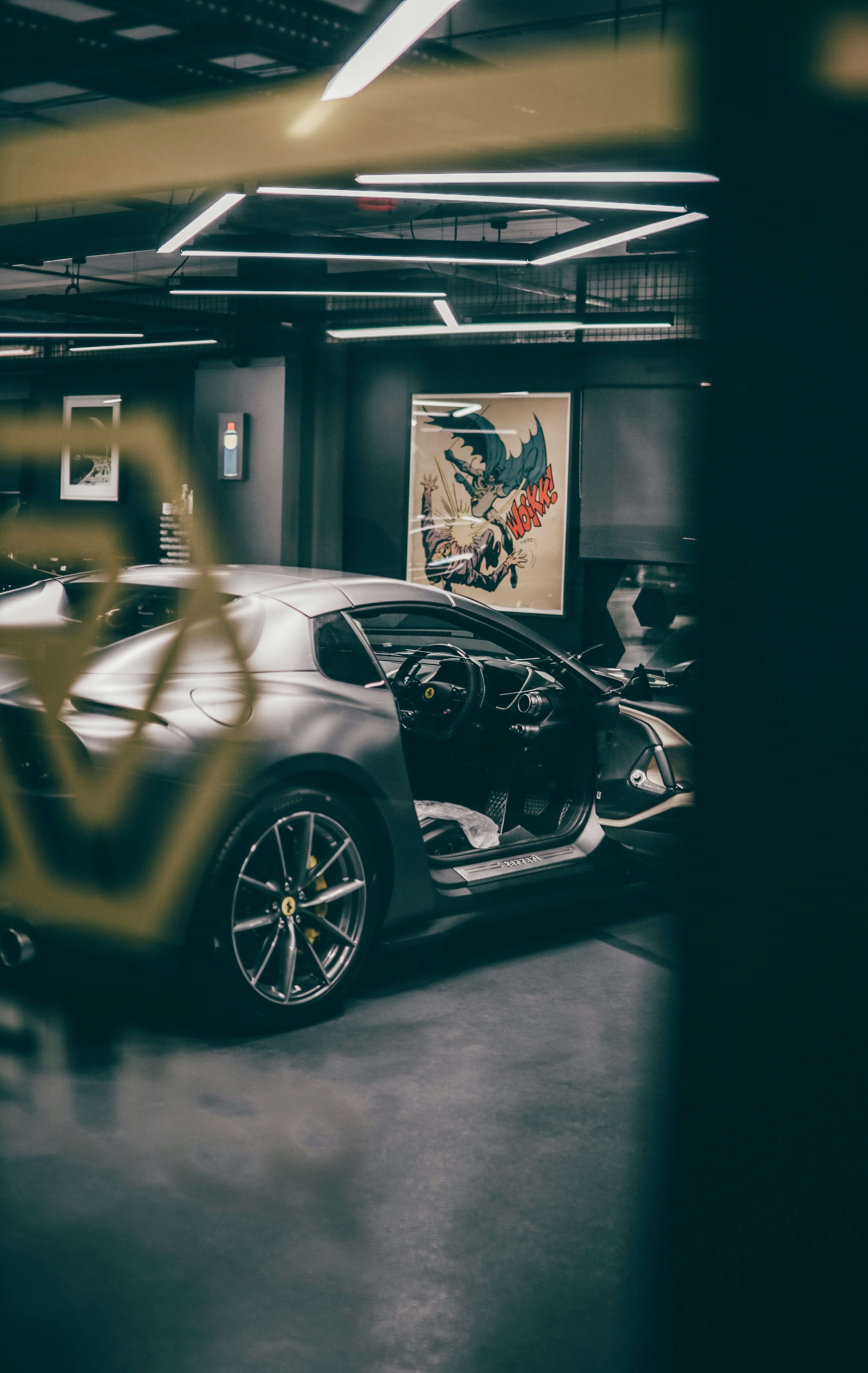 Metallic Silent Drive: A Ferrari I Inside a Modern Gallery