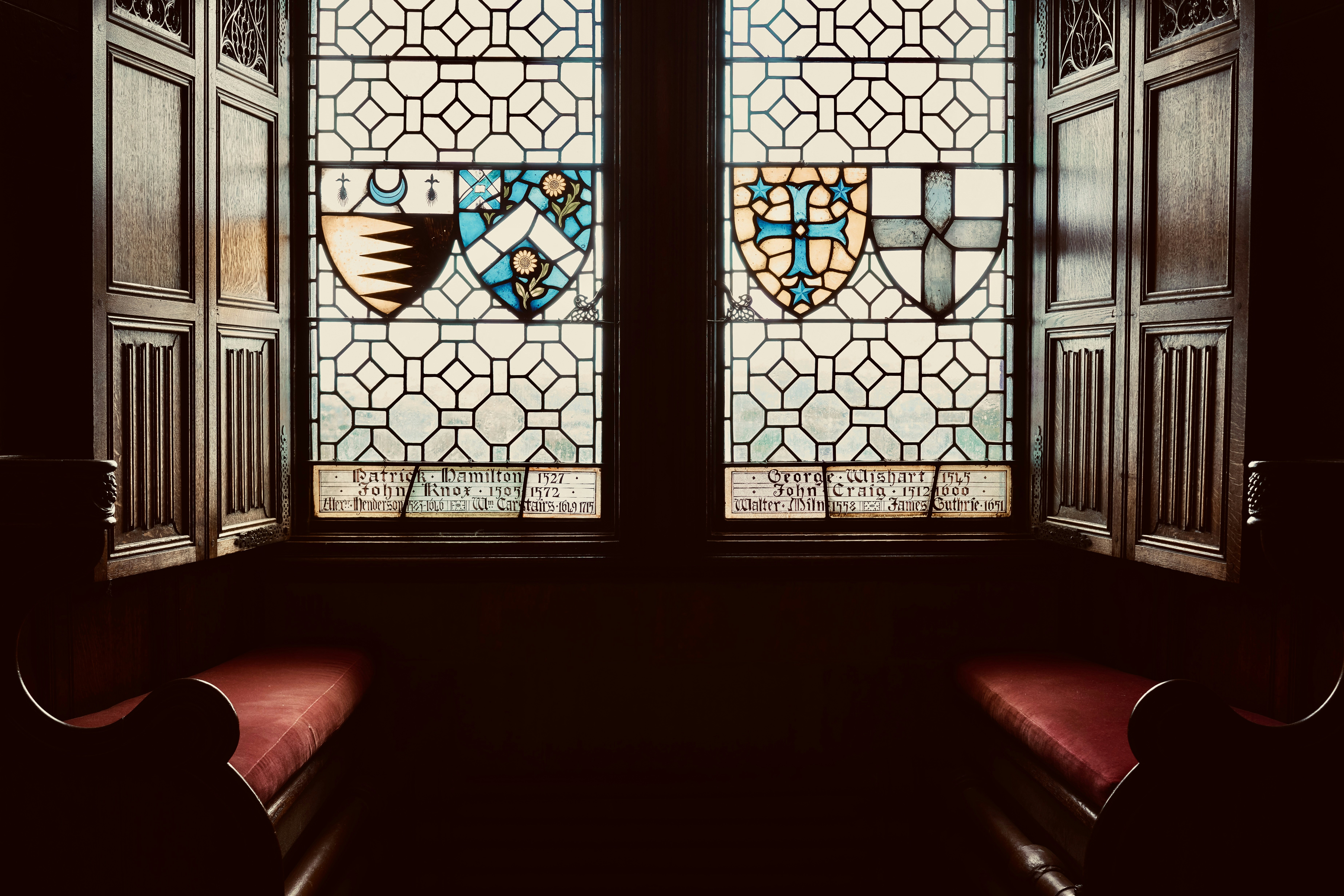 Heraldry Between Light and Wood: A Quiet Chapel Nook
