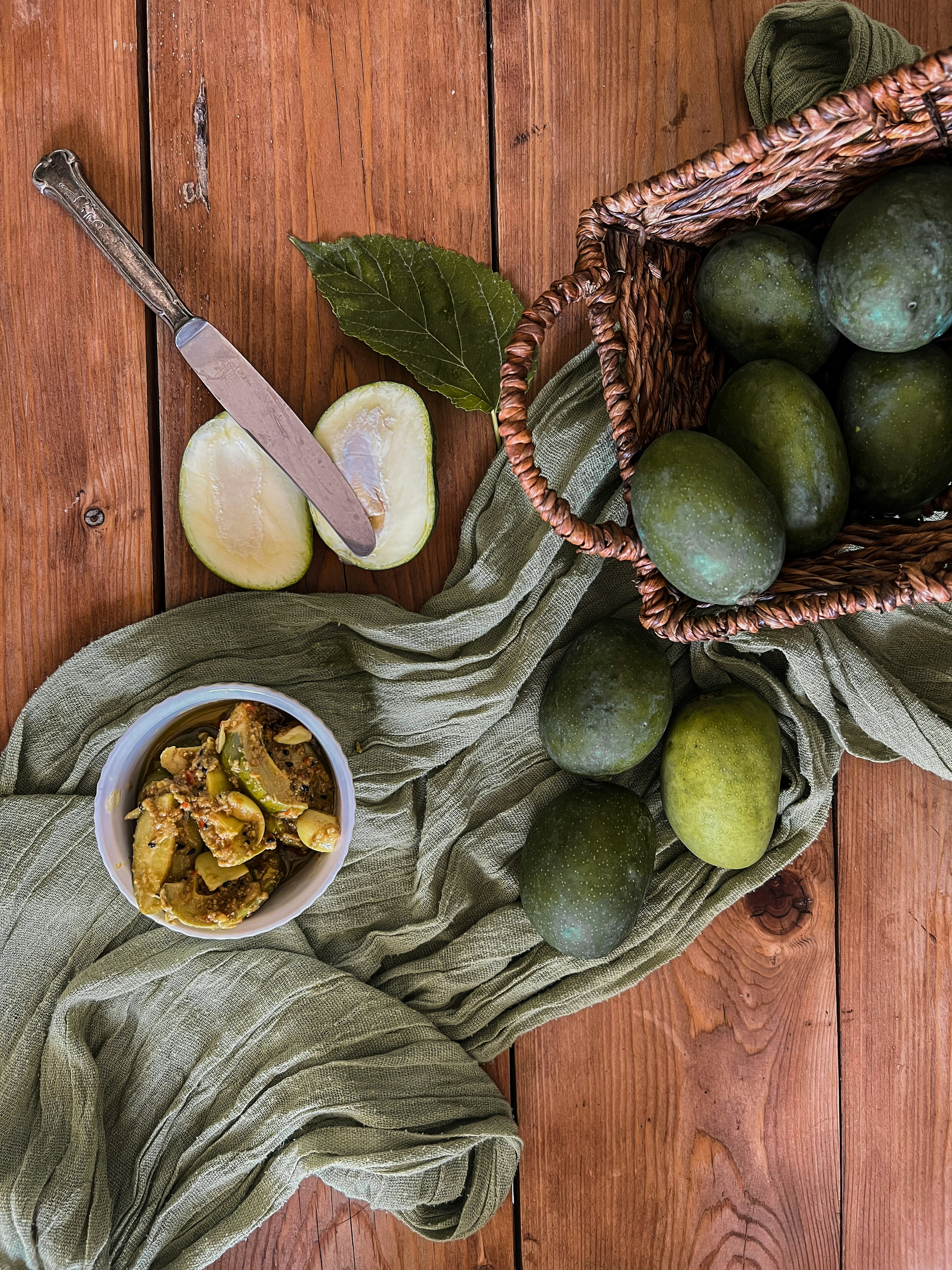 A bowl of food next to a basket of fruit photo – Free Food Image on ...