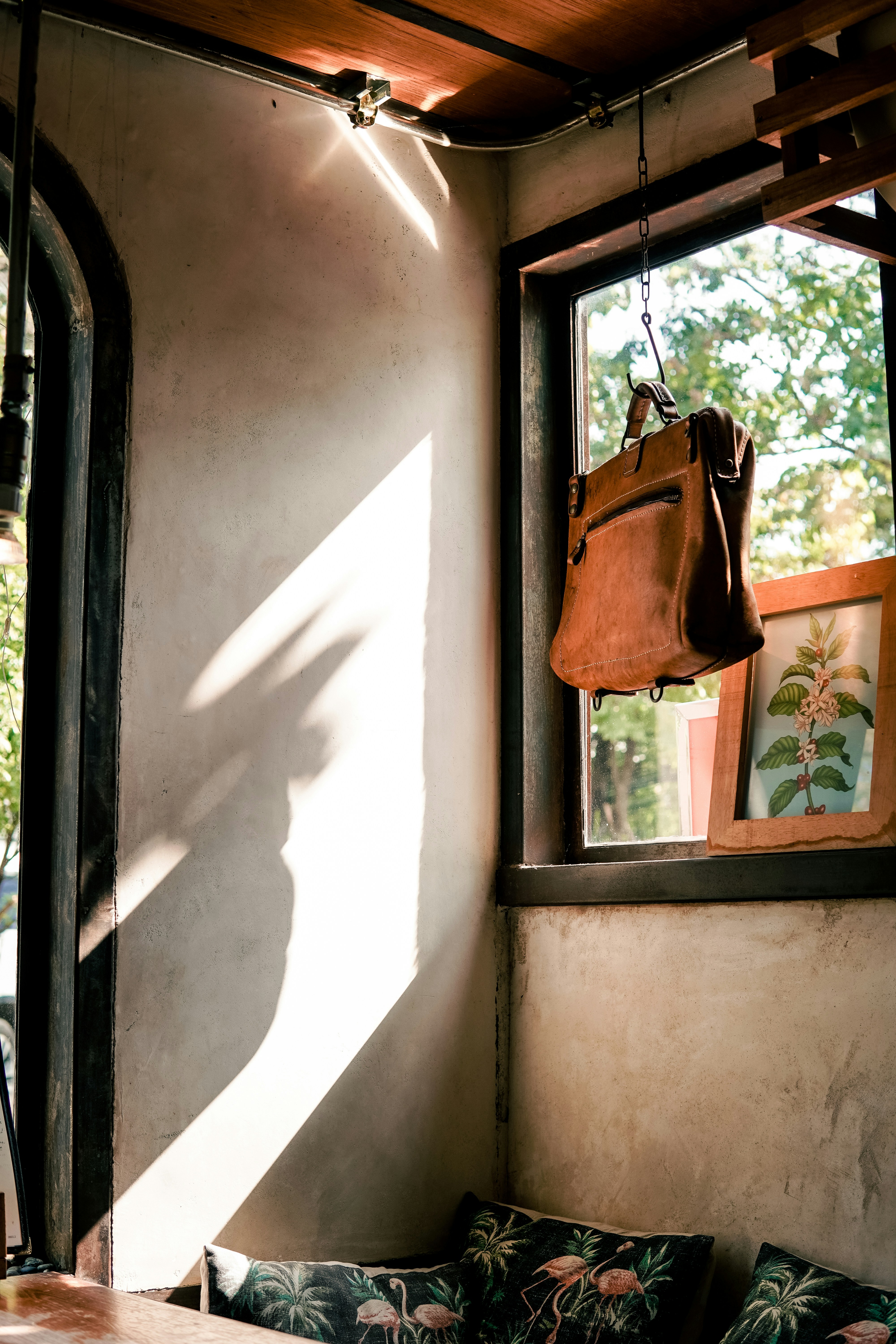 A window with a purse hanging from it's side photo – Free Indoors Image ...