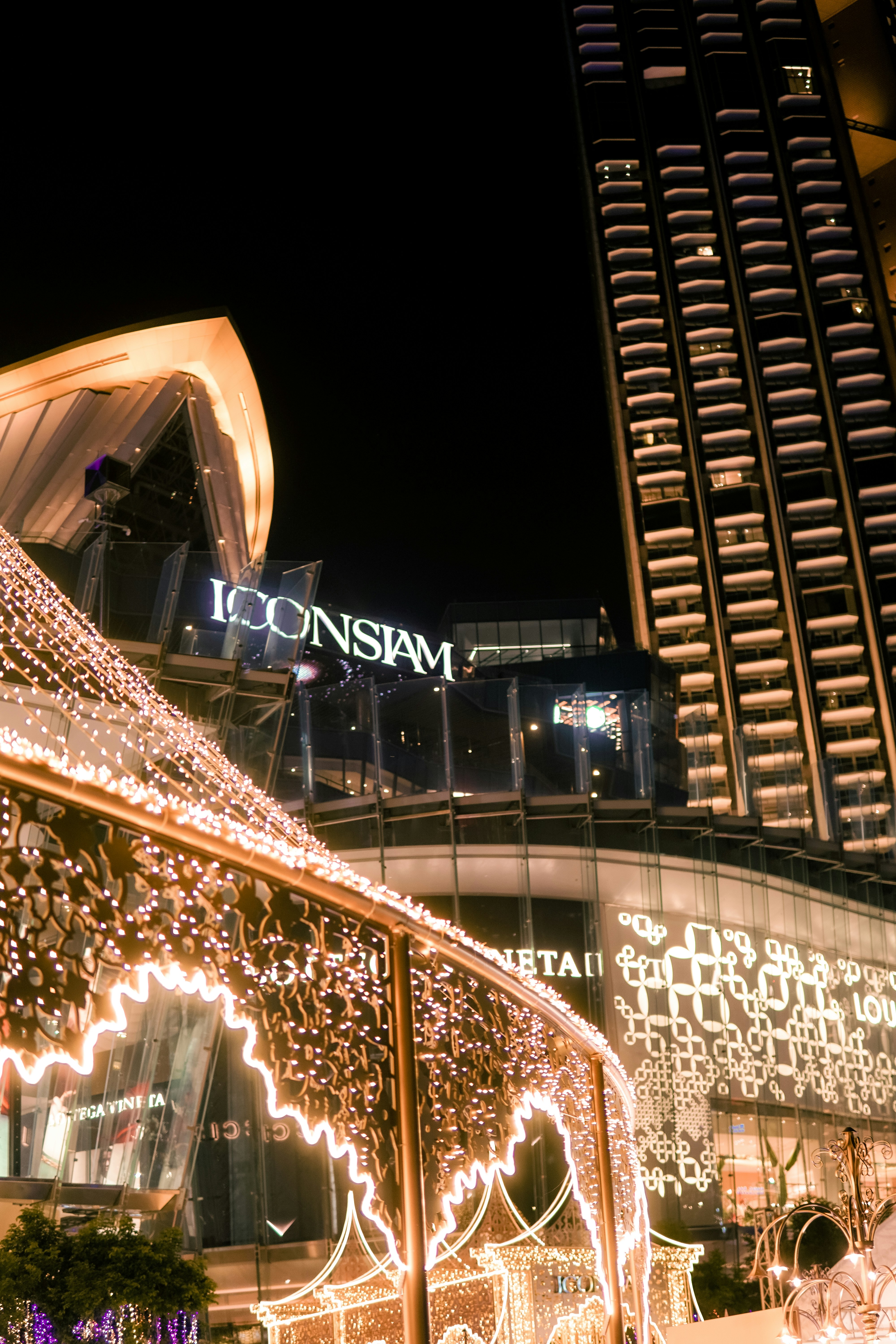 A building that has a lot of lights on it photo – Free Lighting Image ...