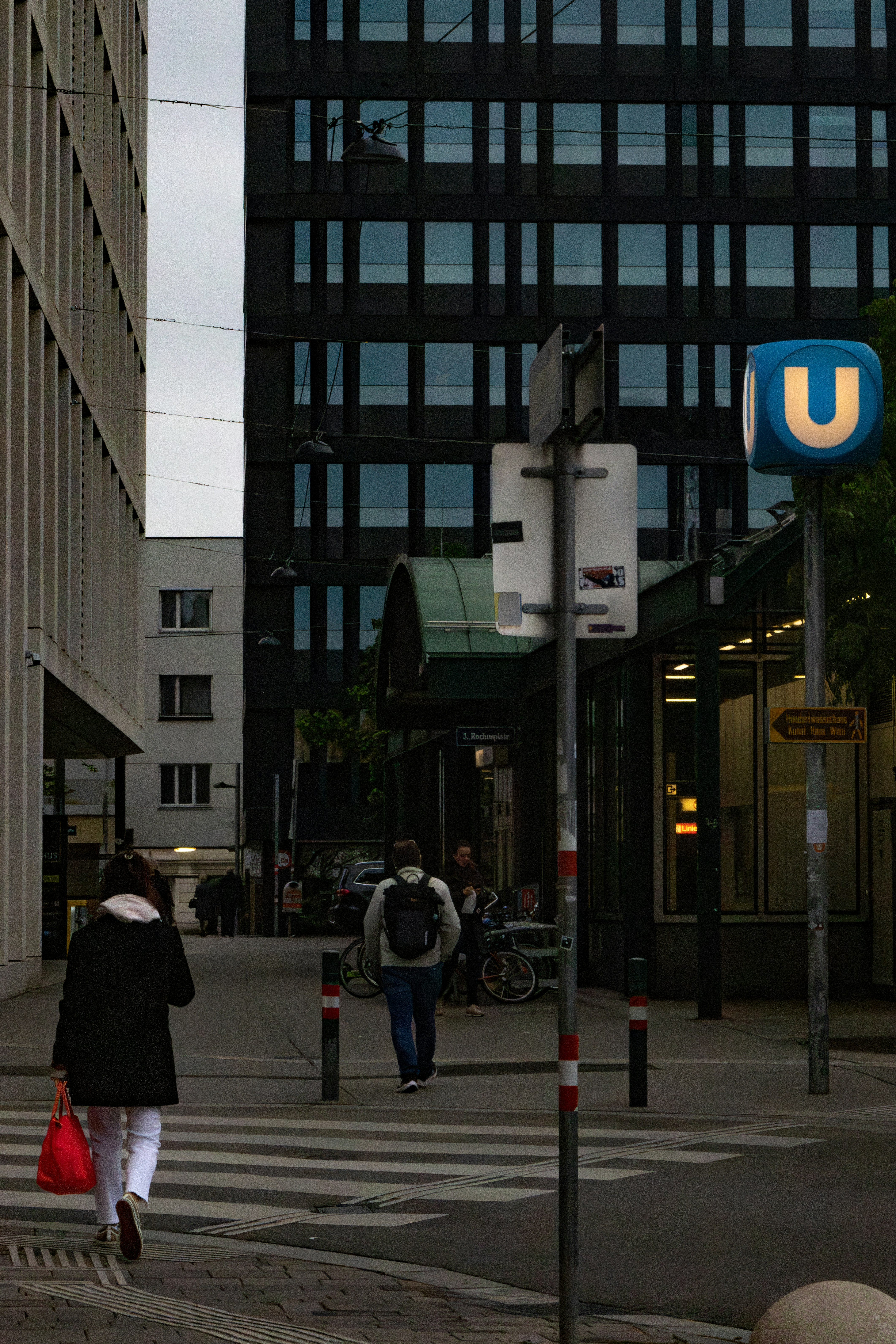 Blue U Beacon Over a Quiet City Crossing