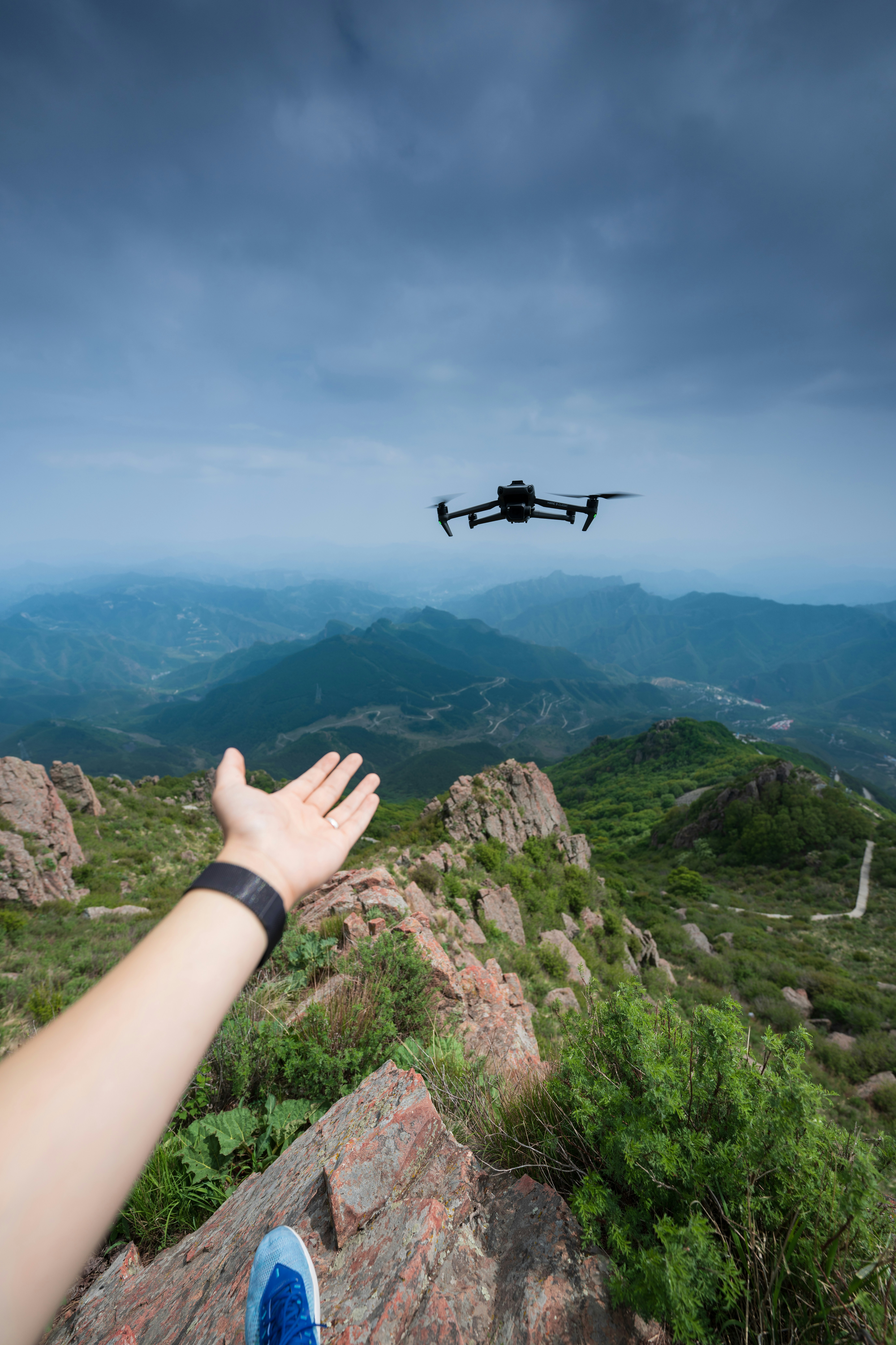 A person reaching out to a remote control plane in the sky photo – Free ...