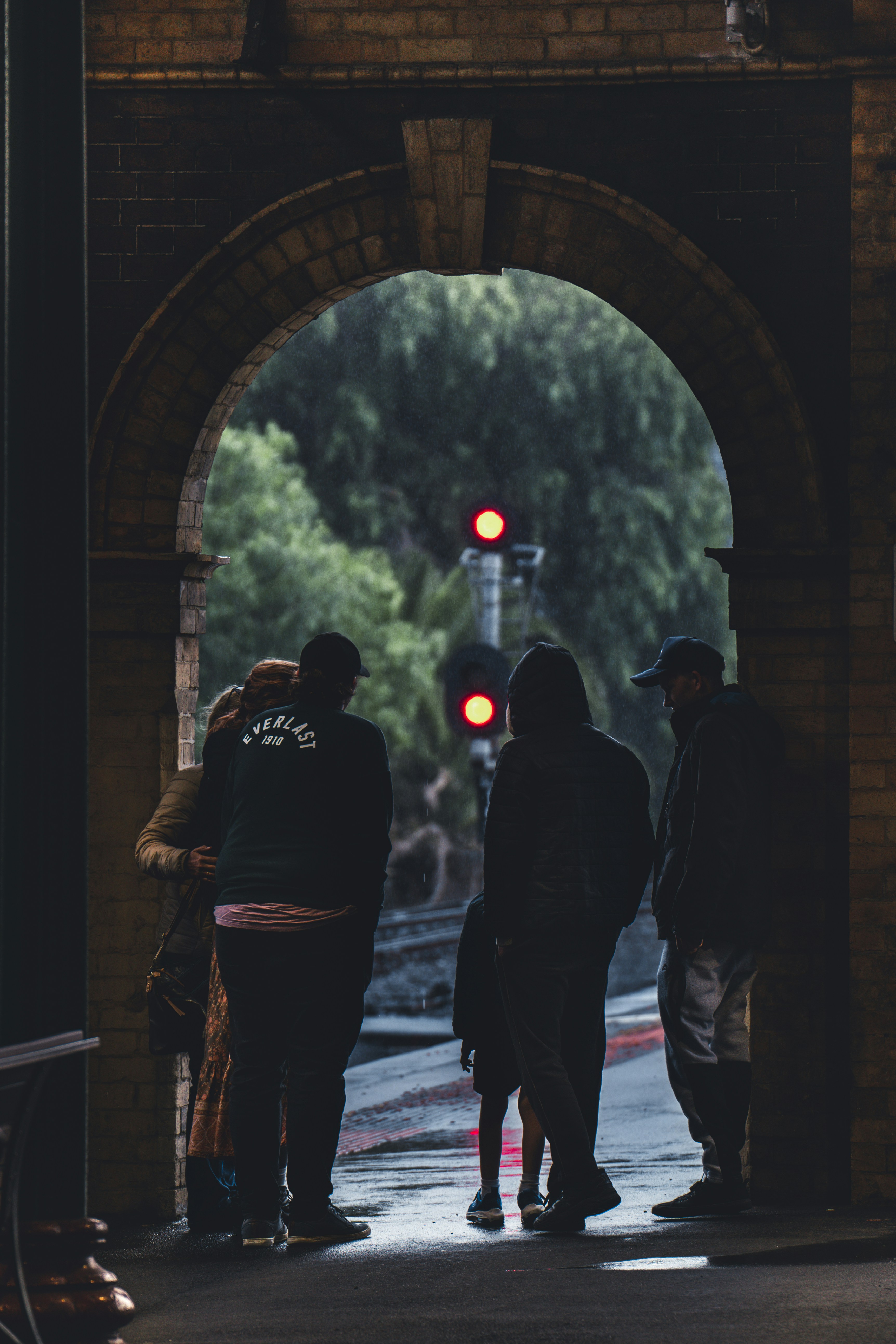 Archway Convergence: silhouettes at the tunnel’s threshold