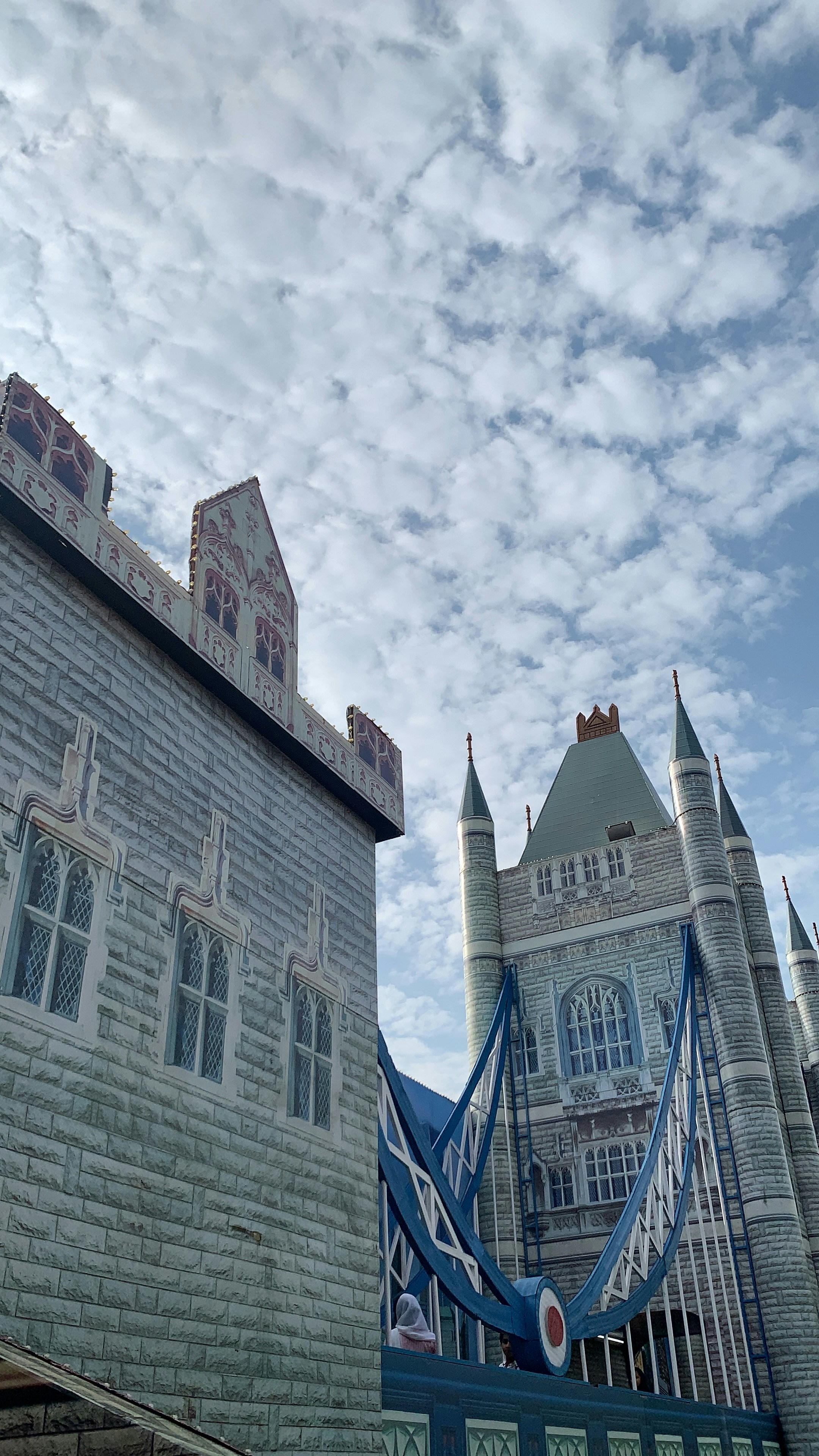 A castle like building with a blue gate photo – Free Perinthalmanna ...