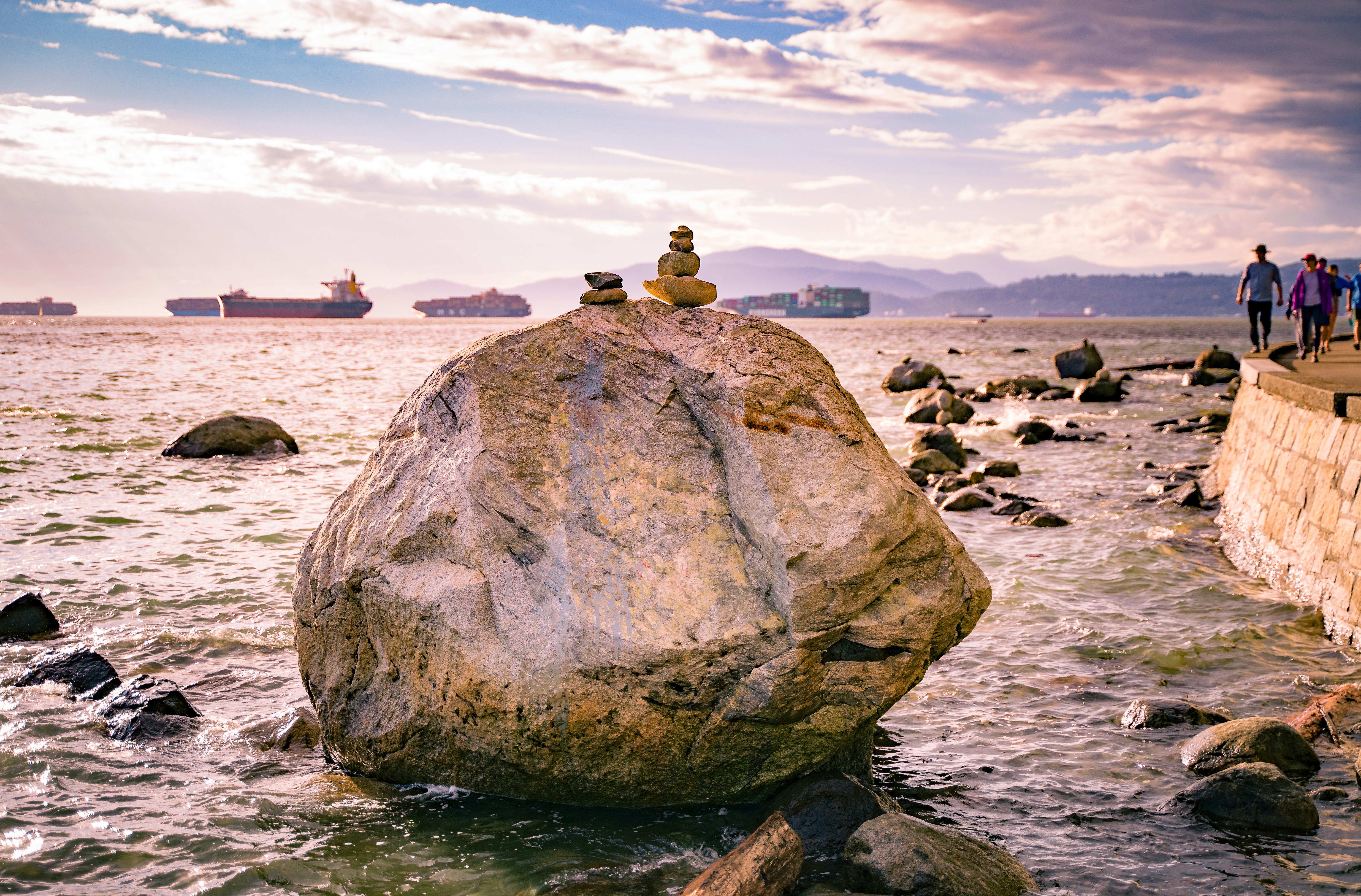 Cairn Crowned Boulder at Dusk: Quiet Fortitude by the Sea