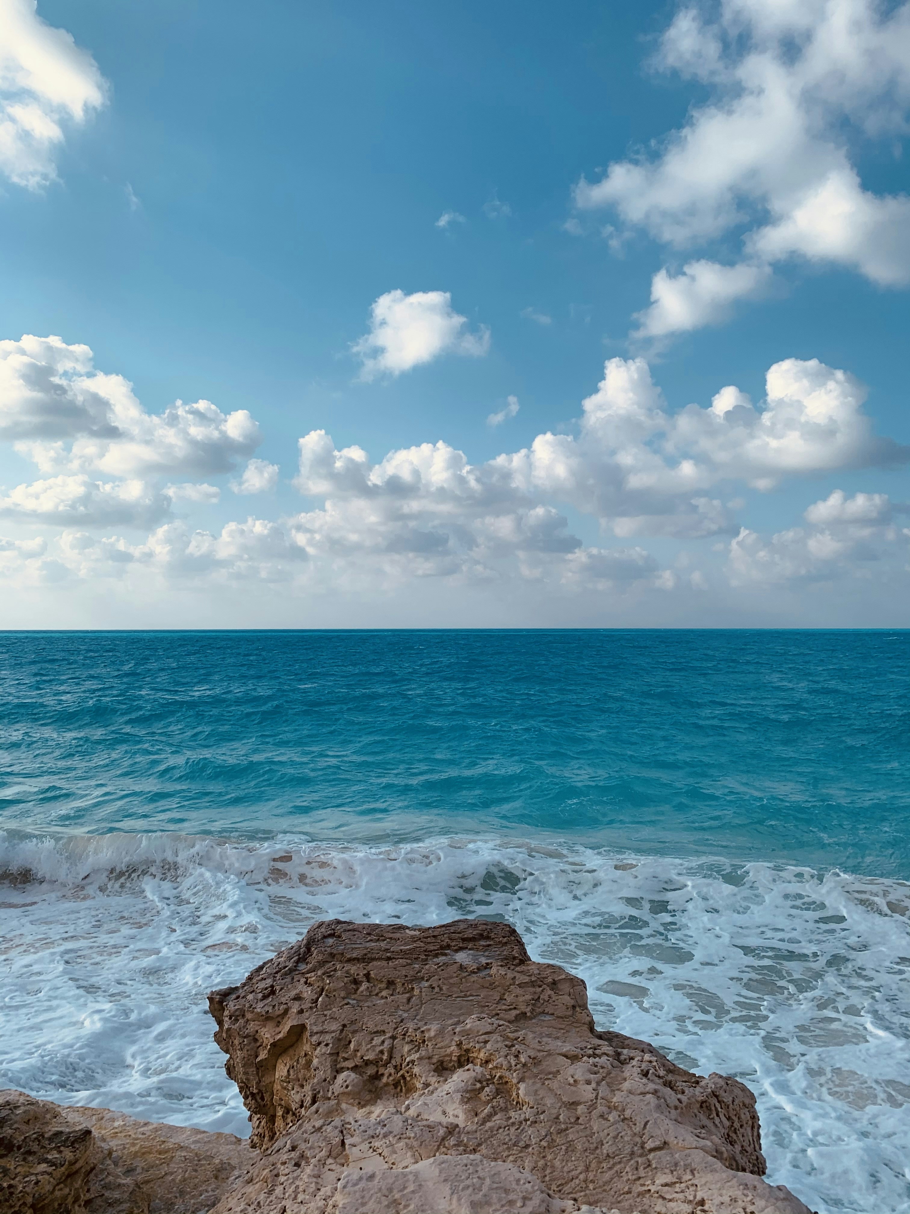 A view of the ocean from a rocky outcropping photo – Free Travel Image ...