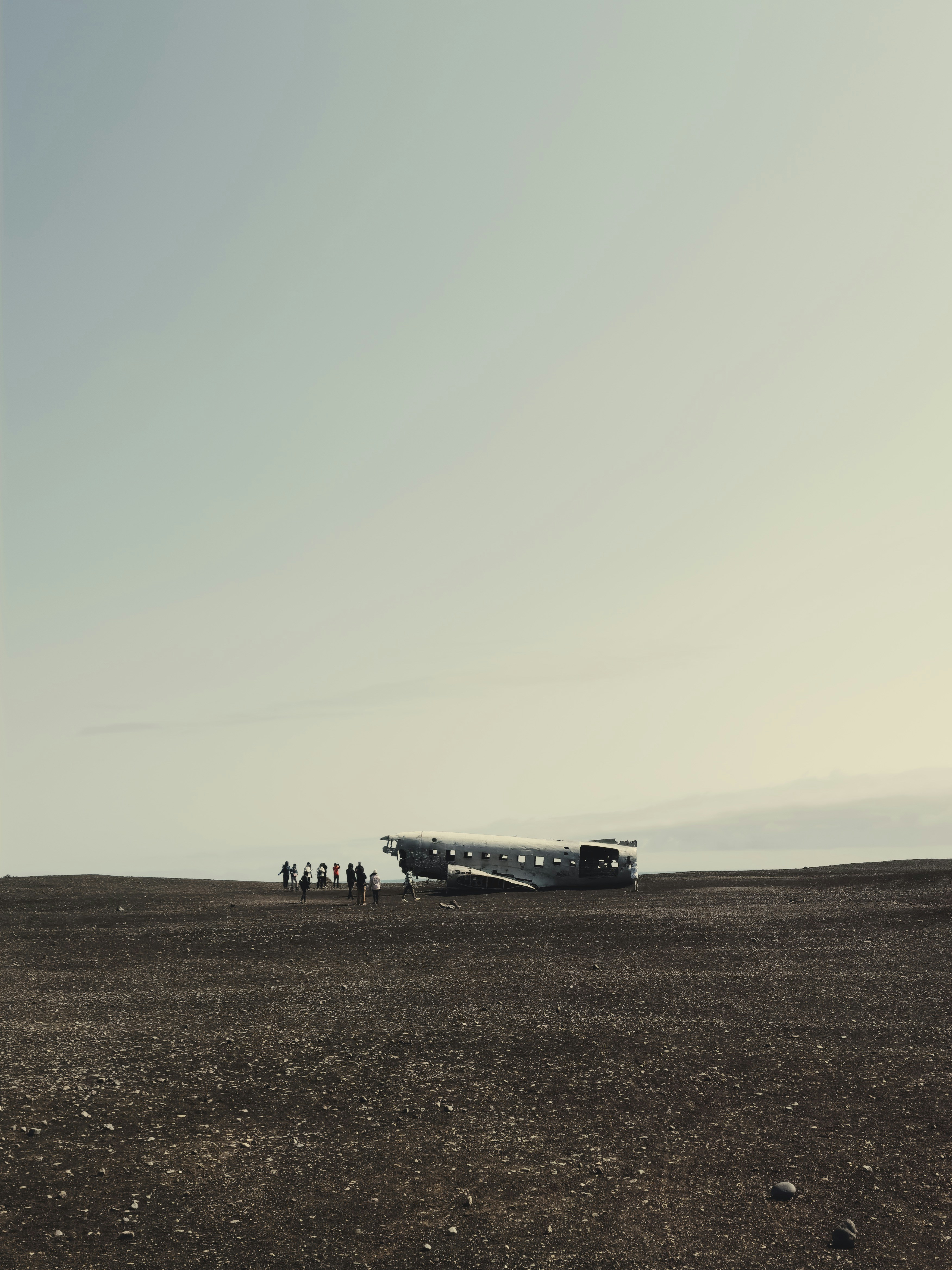Ghost Jet on a Gravel Plain: A Quiet Assembly Under a Pale Sky