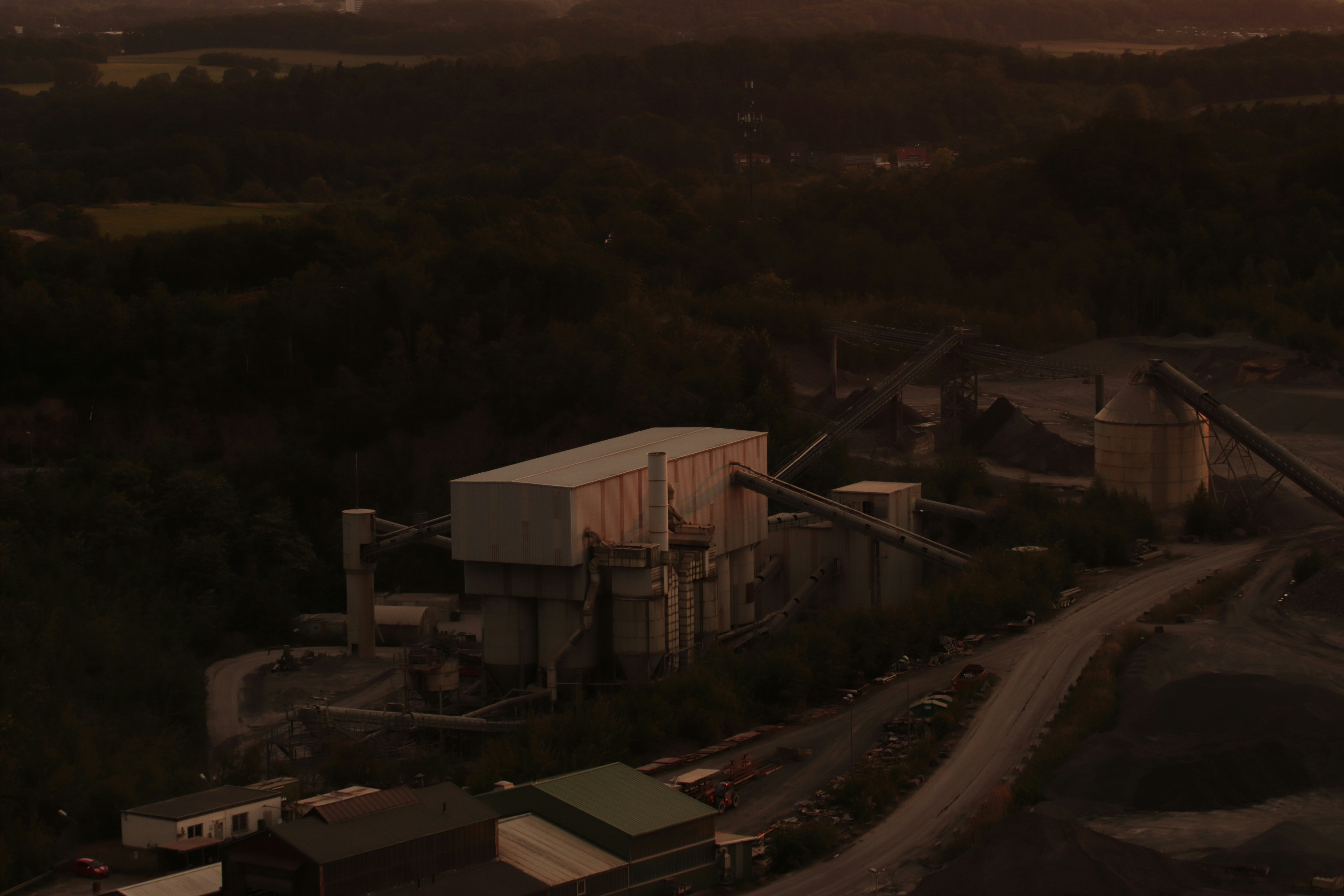 Twilight Over the Conveyor Spine: A Quiet Industrial Landscape