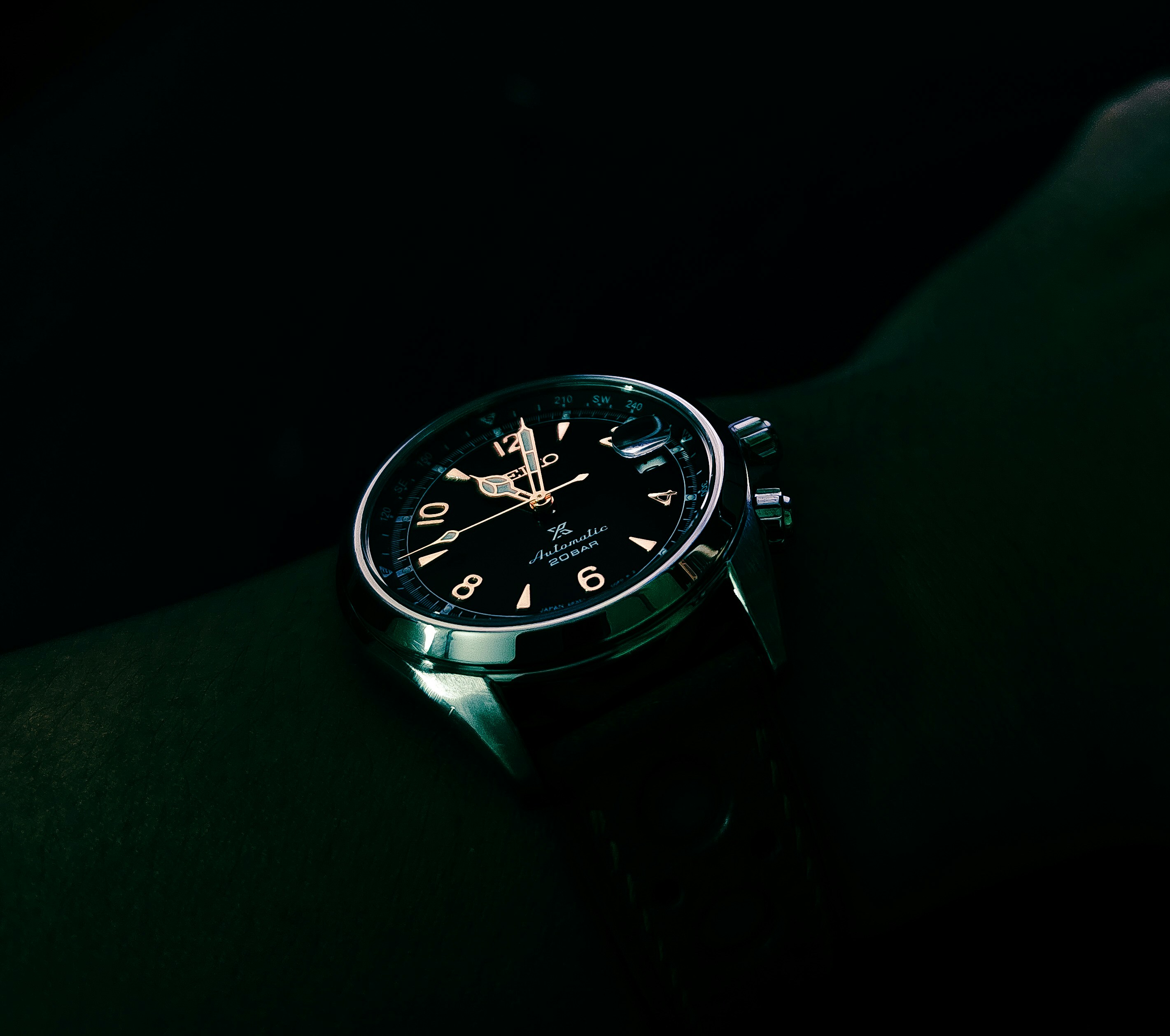 A watch that is on someones wrist in the dark photo – Free Seiko watch ...