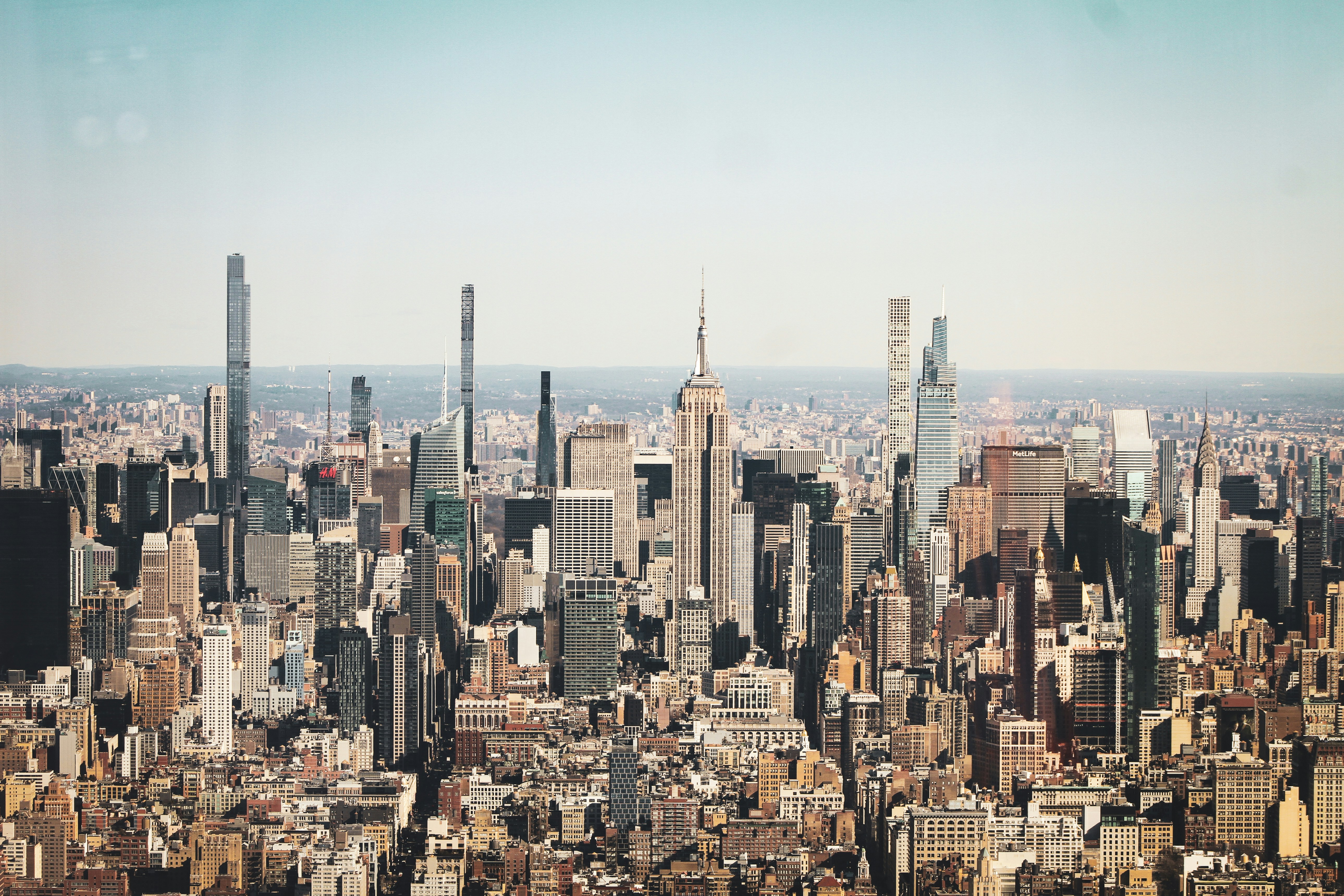 A view of a large city with tall buildings photo – Free Cityscape Image ...