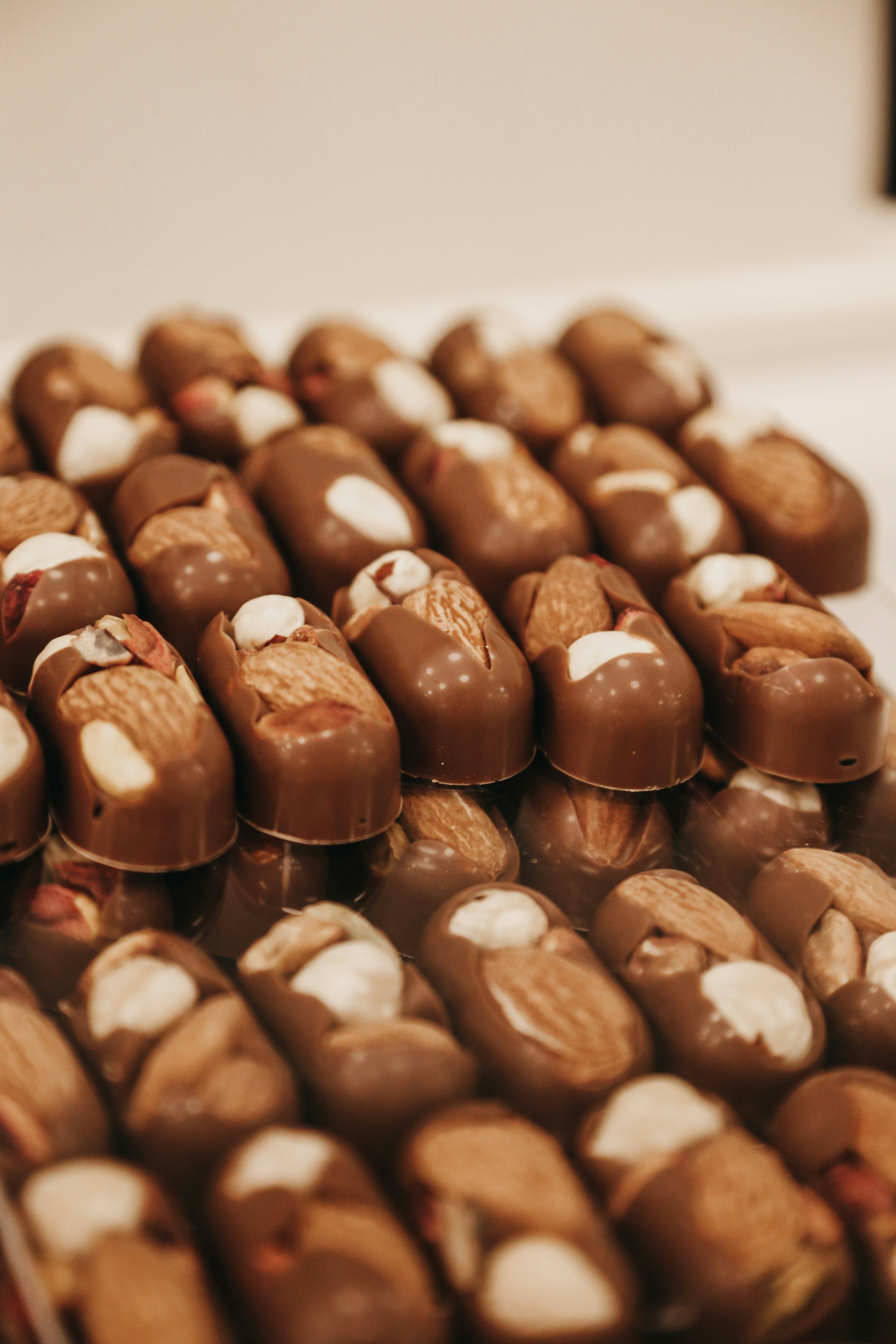 Boxed Chocolate Bloom: A Close-Up of Rolled Nougat-Covered Treats