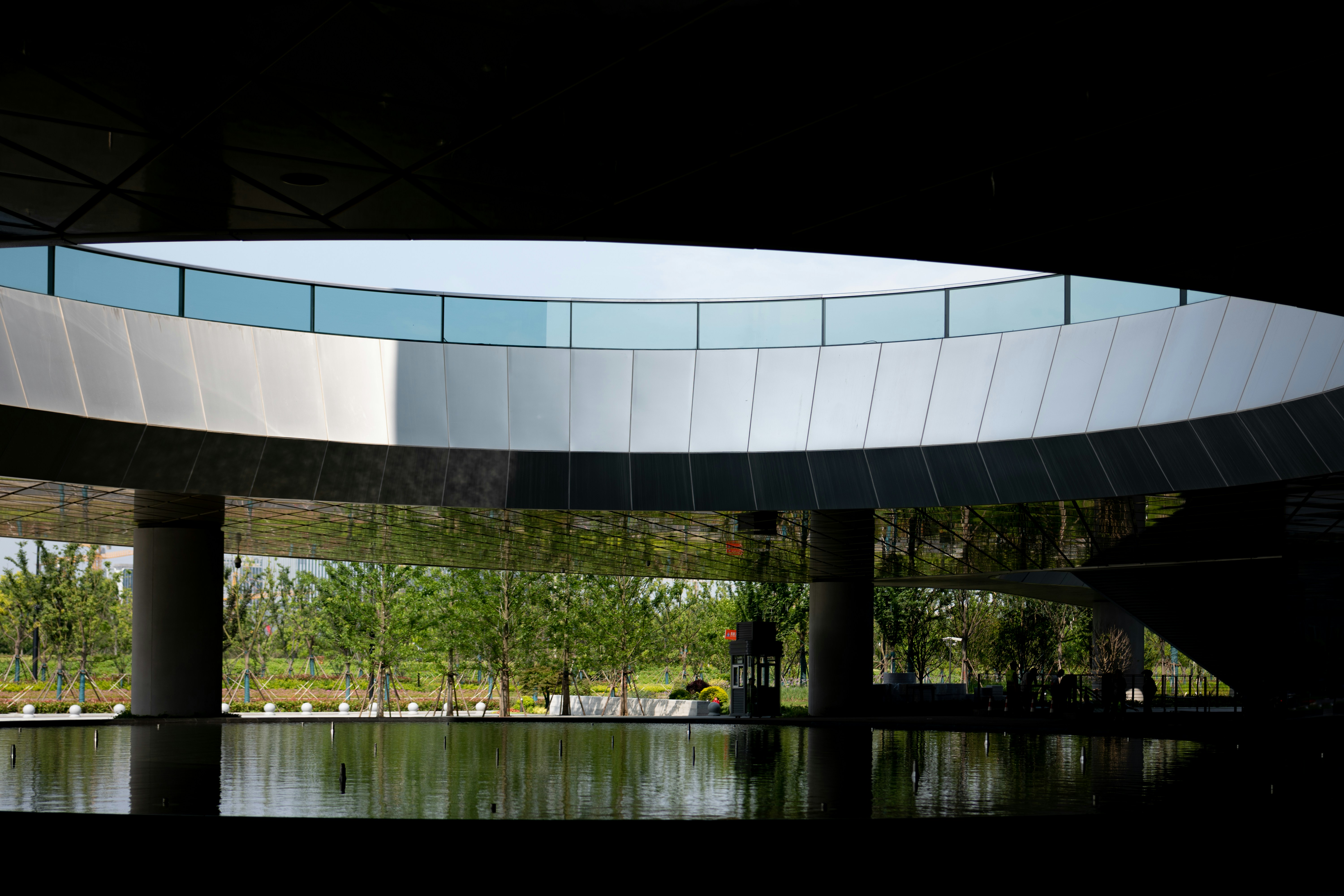 A circular building with a glass window on top of it photo – Free ...