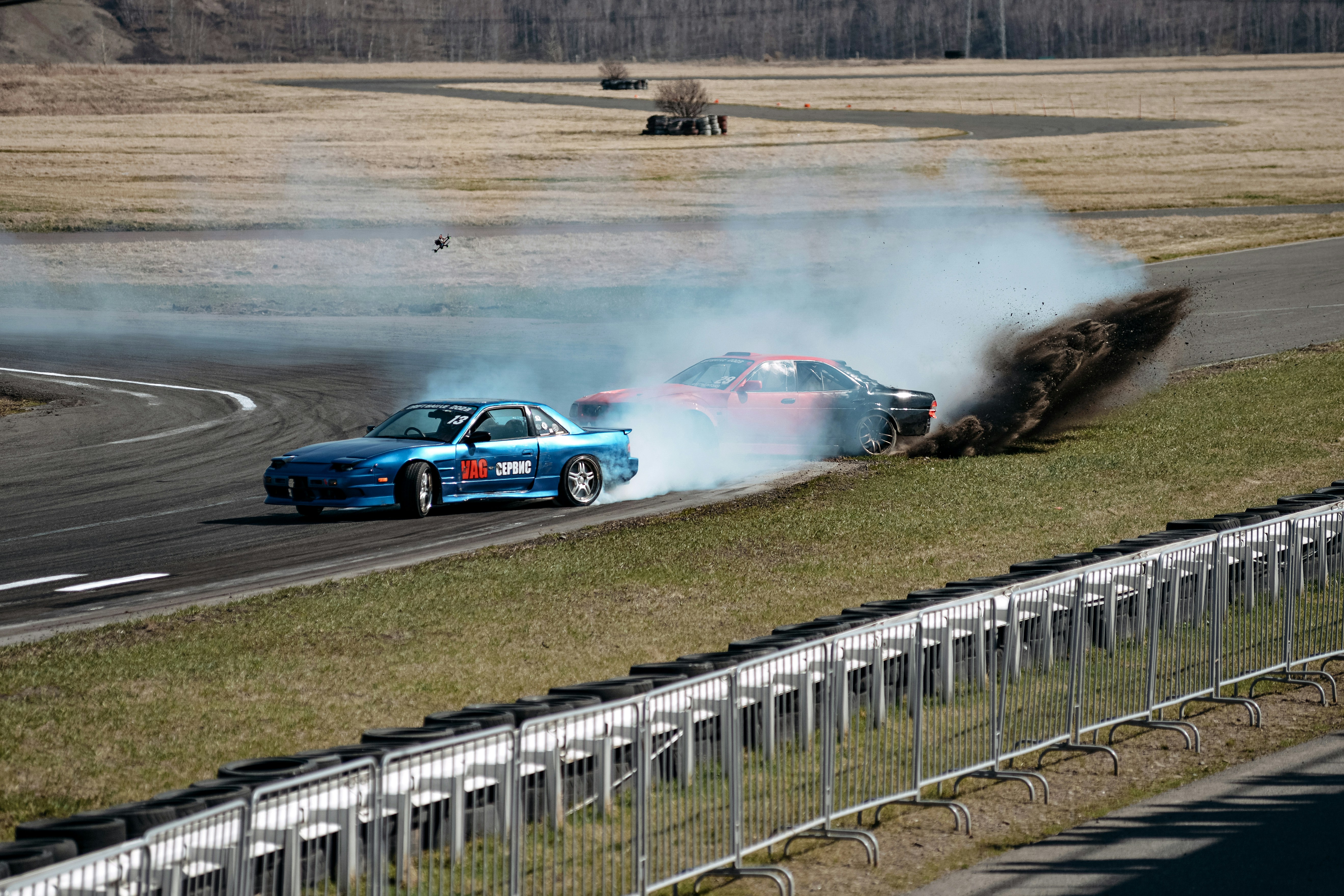 Blue Fury in a Smoke Screen: Drift Duel on the Winding Circuit