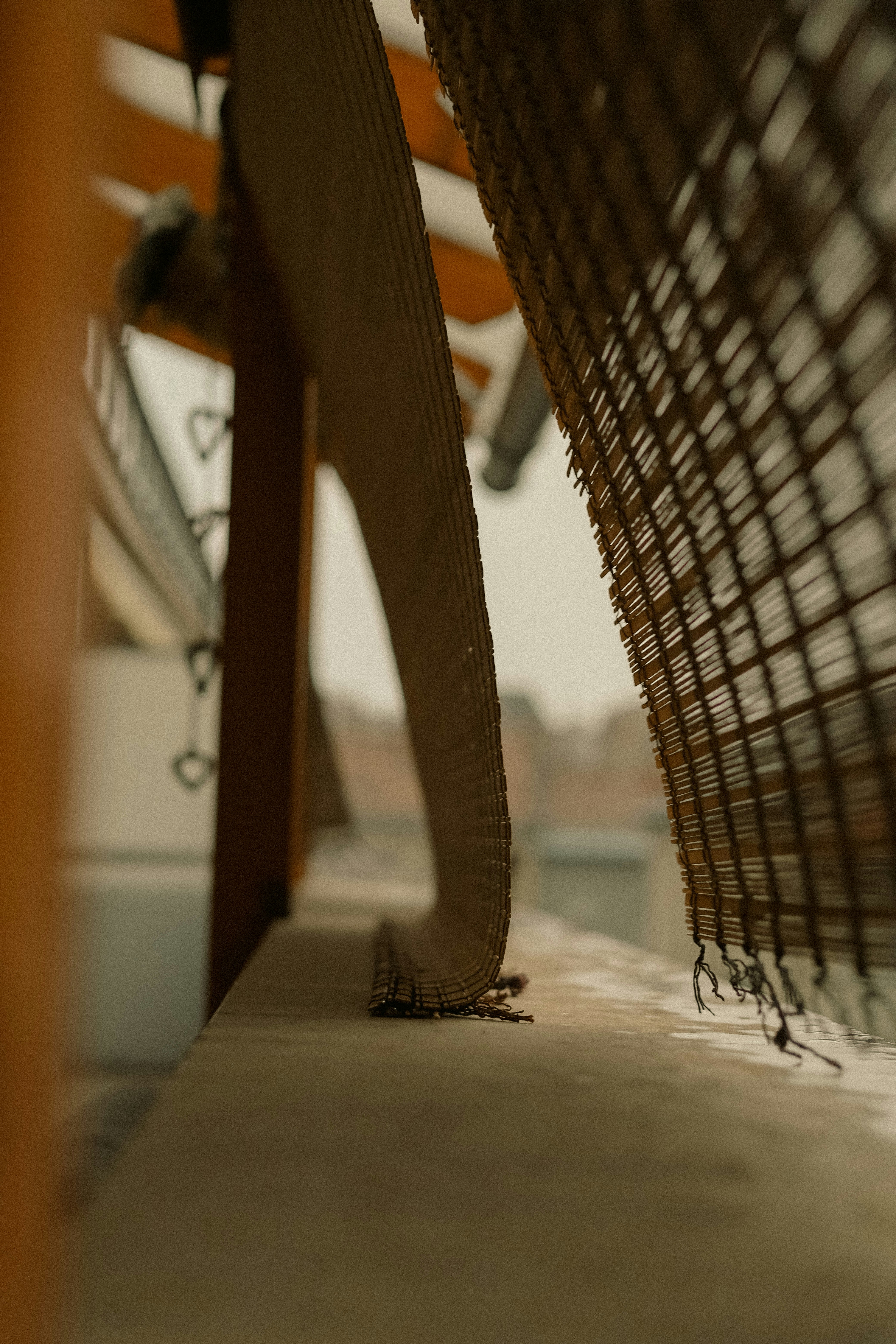 Weaving the Light: A Rooftop Climb Through Mesh and Sun