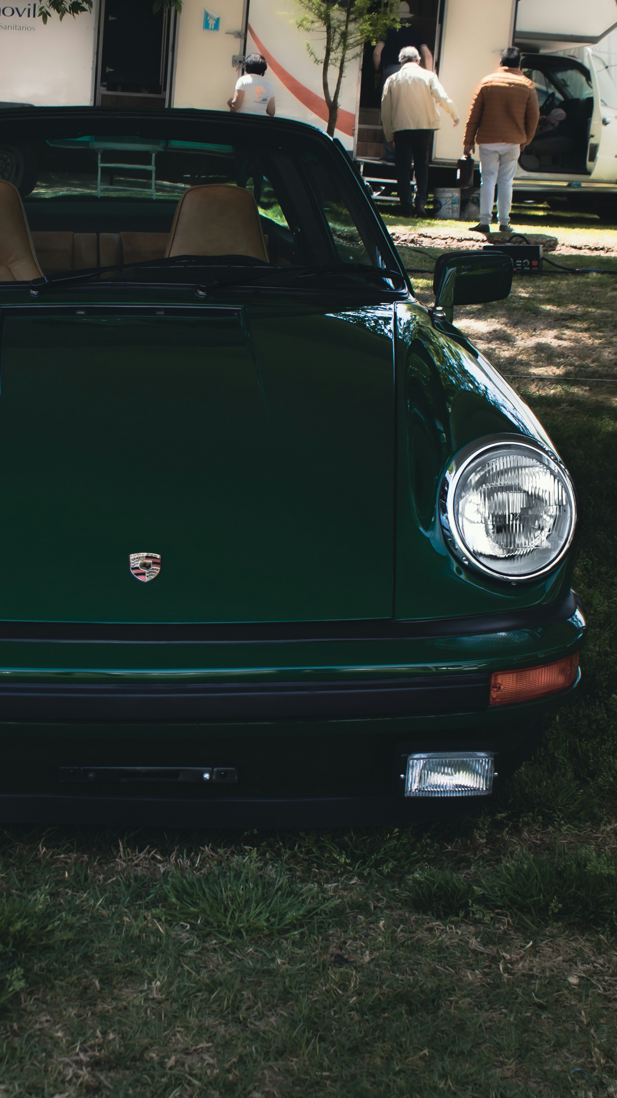 Emerald Porsche Front View at a Casual Outdoor Car Show