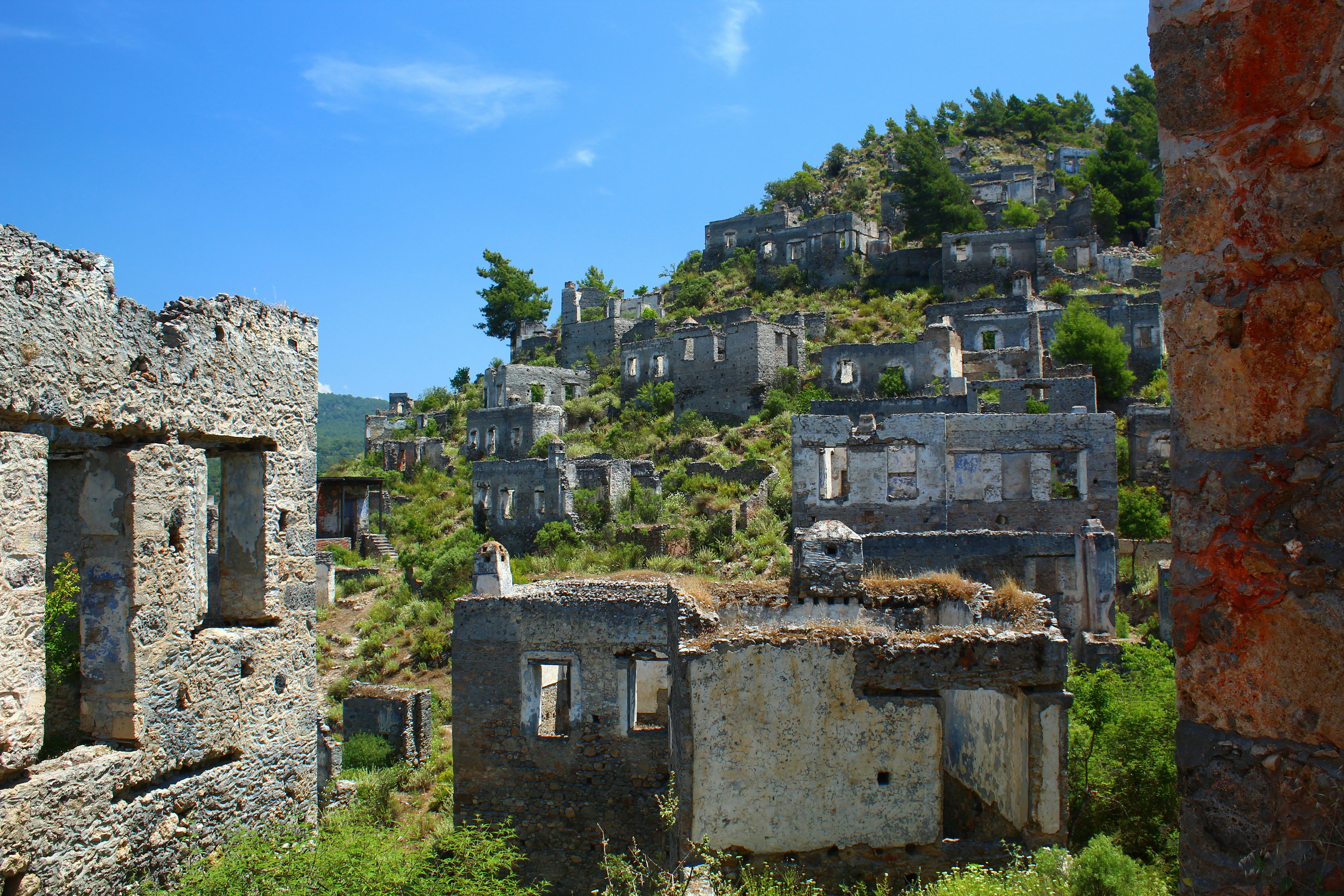 The ruins of a village on a hill photo – Free Kayaköy Image on Unsplash