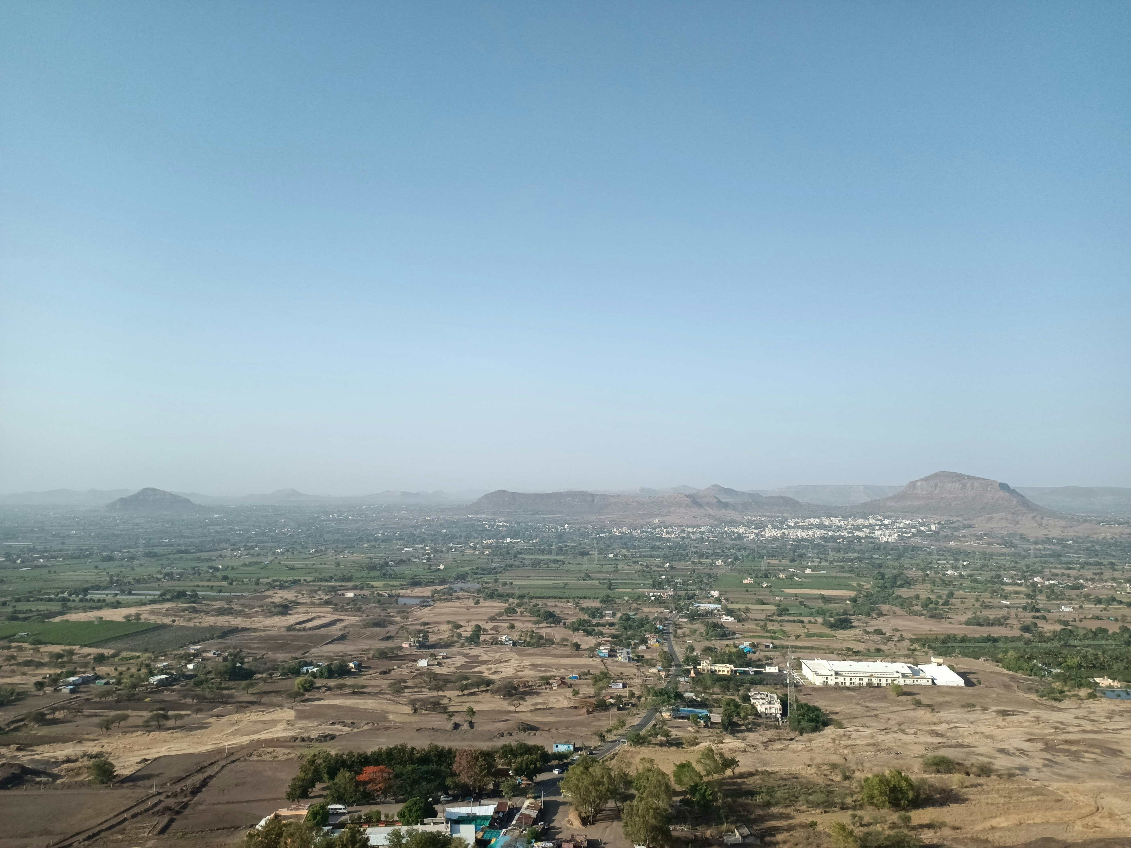 An aerial view of a small town in the desert photo – Free Maharashtra ...