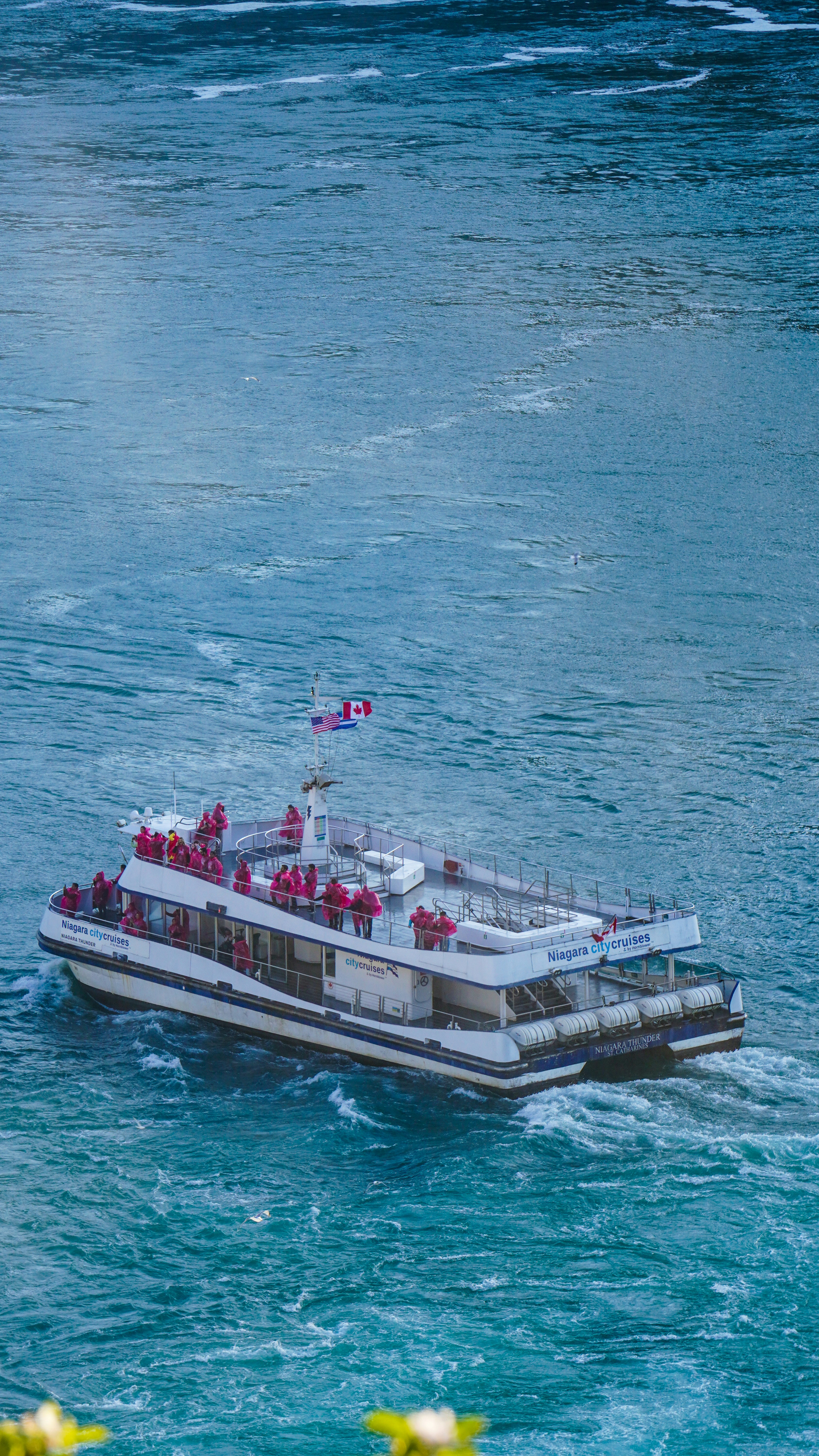 Red-Jacket Niagara Cruise Slicing Through Turquoise Waters