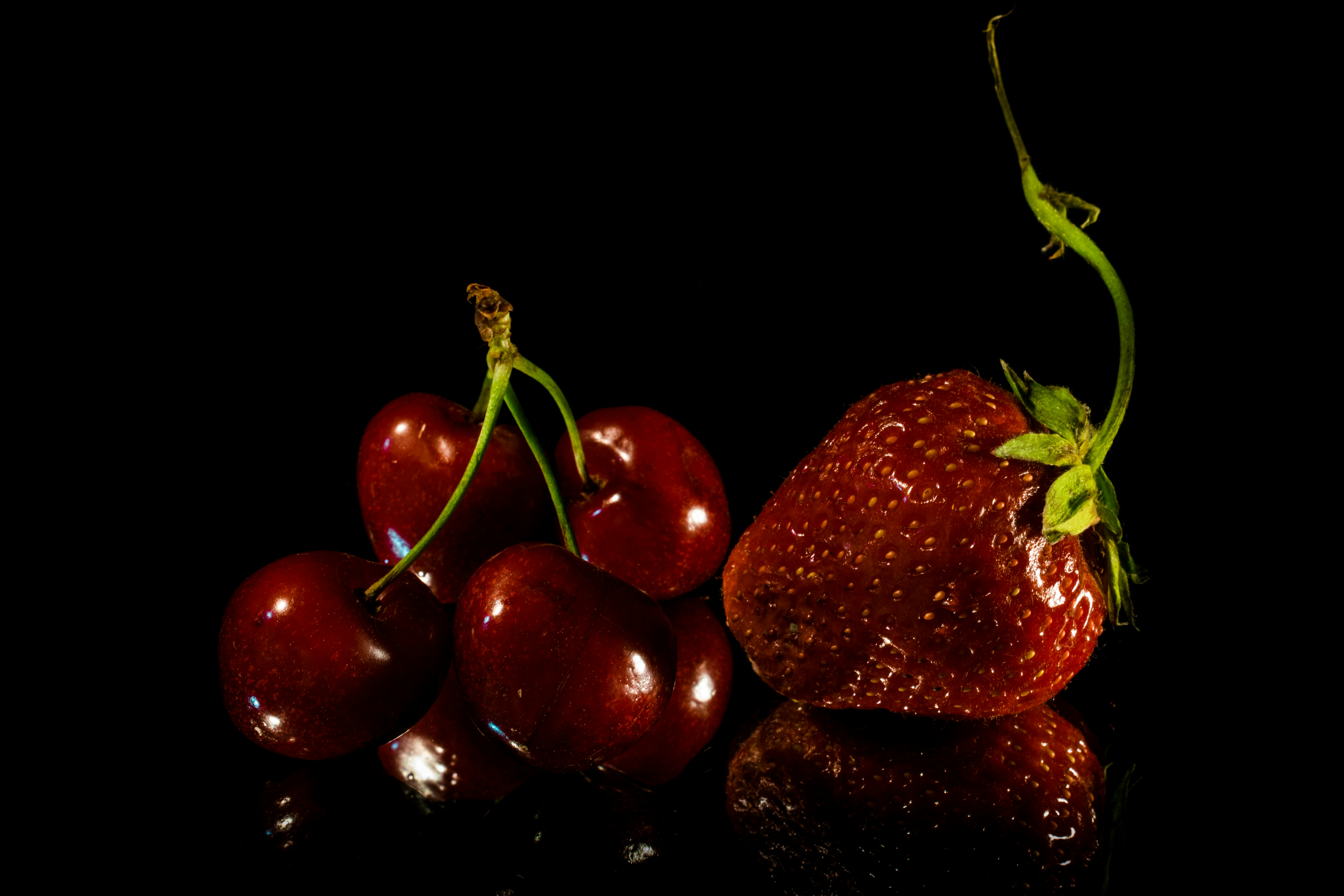 Velvet Night Still-Life: Cherries and a Strawberry on a Black Mirror