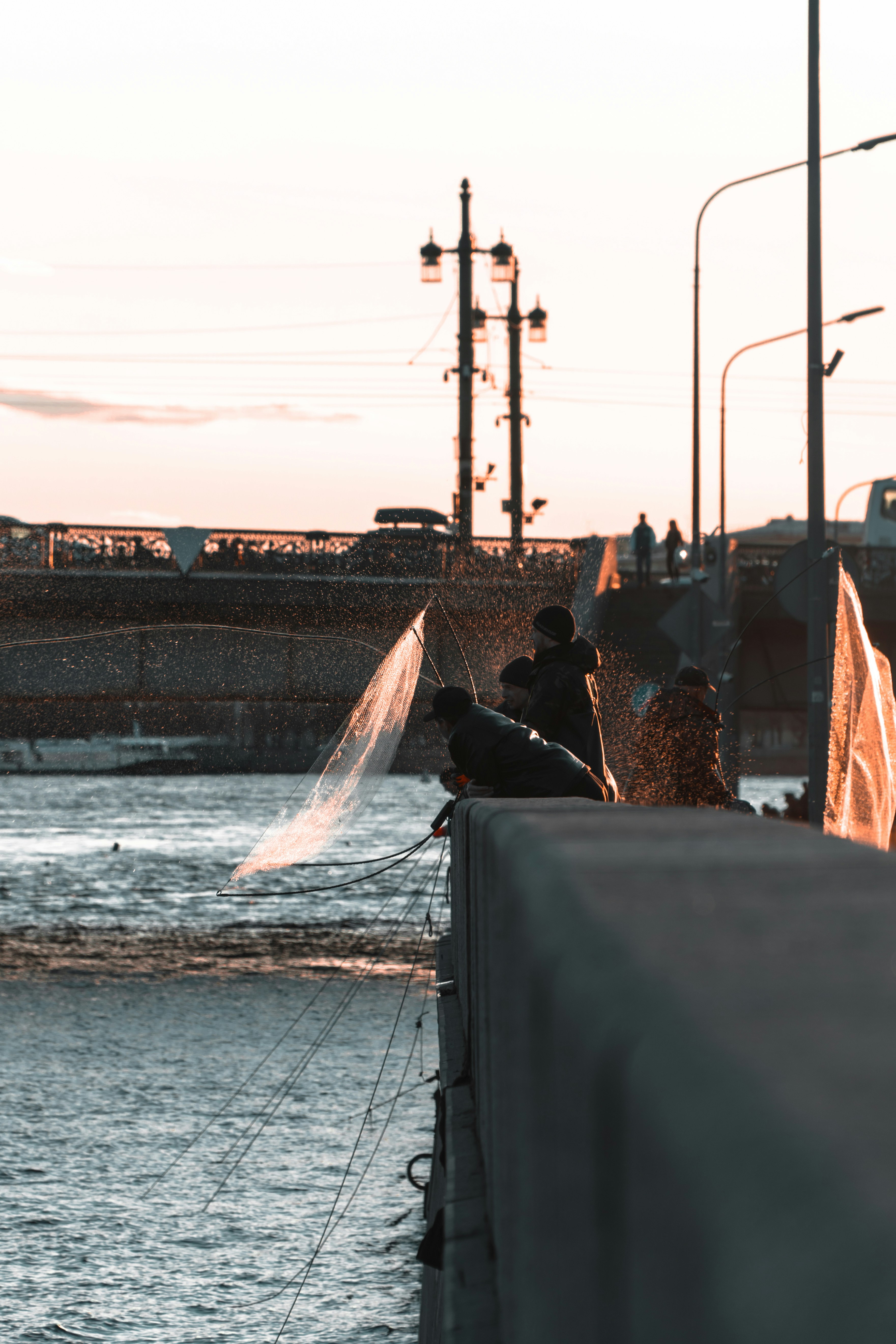 Net of Fishermen at Dusk: Nets Cast Along the Pier