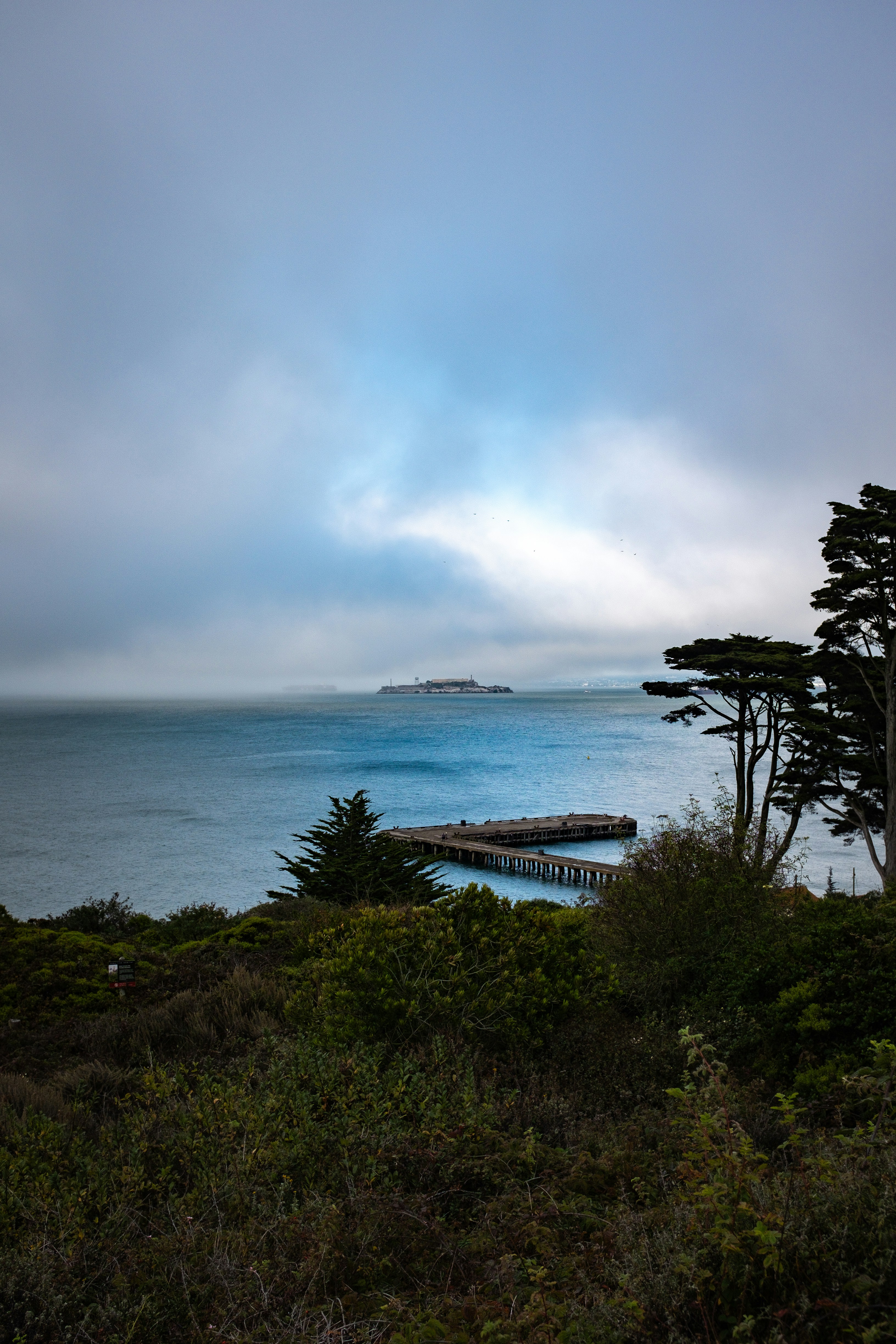 Isle on the Mist: Pier Reaching Toward the Horizon