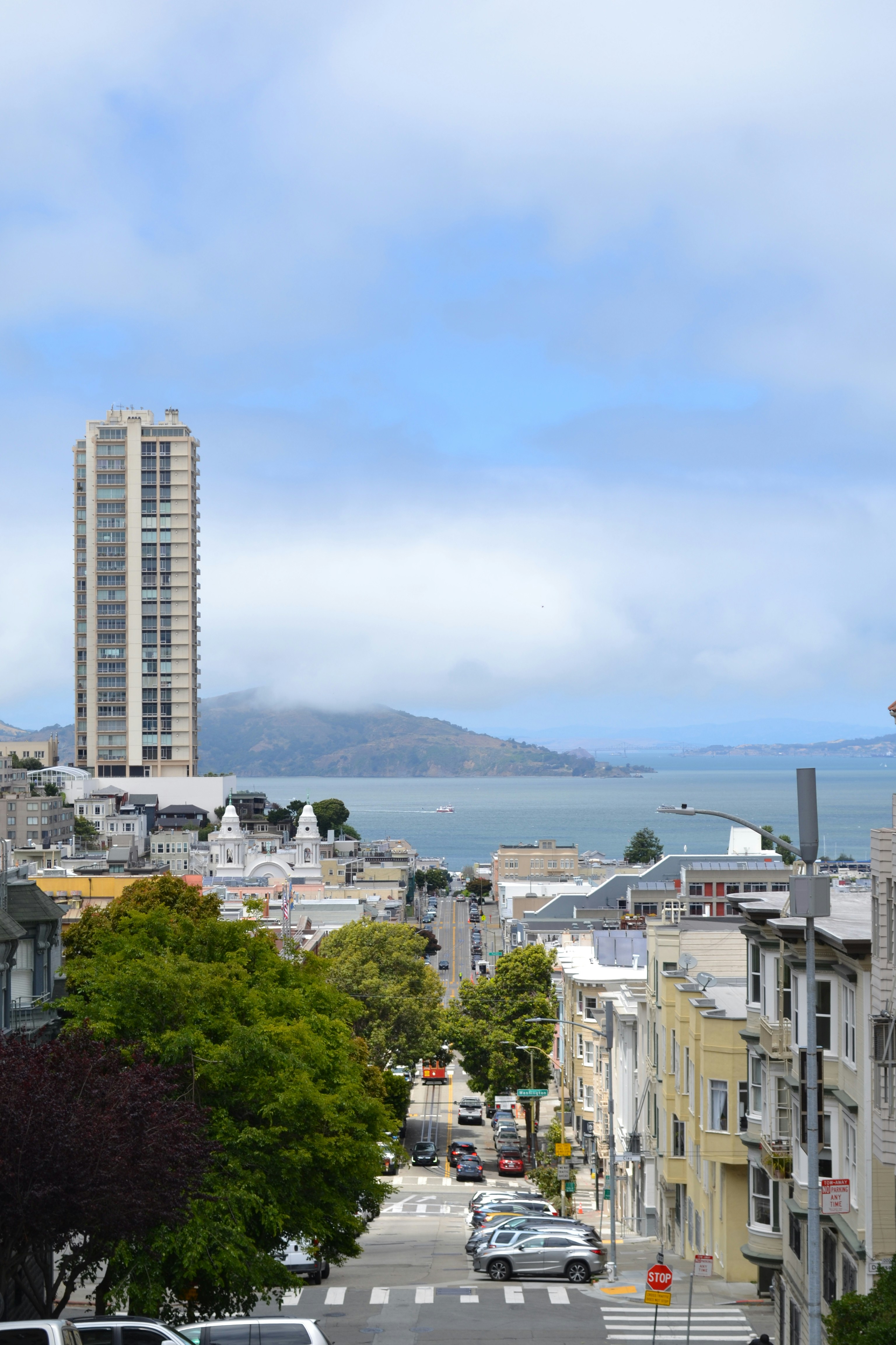 Coastal City Cascade: Street, Sea, and Sky