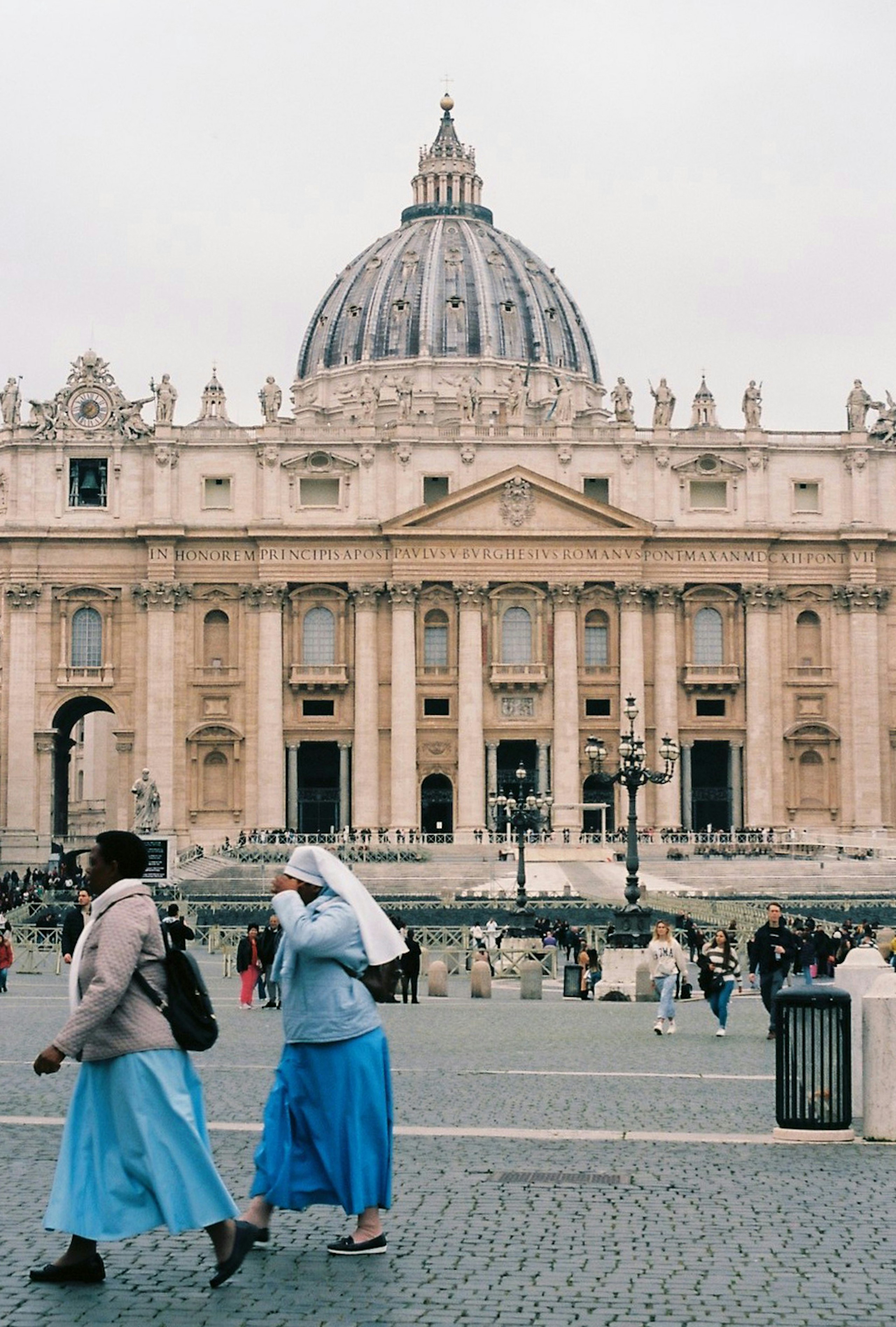 Dome and Pedestrians: A Quiet Piazza Before St. Peter's