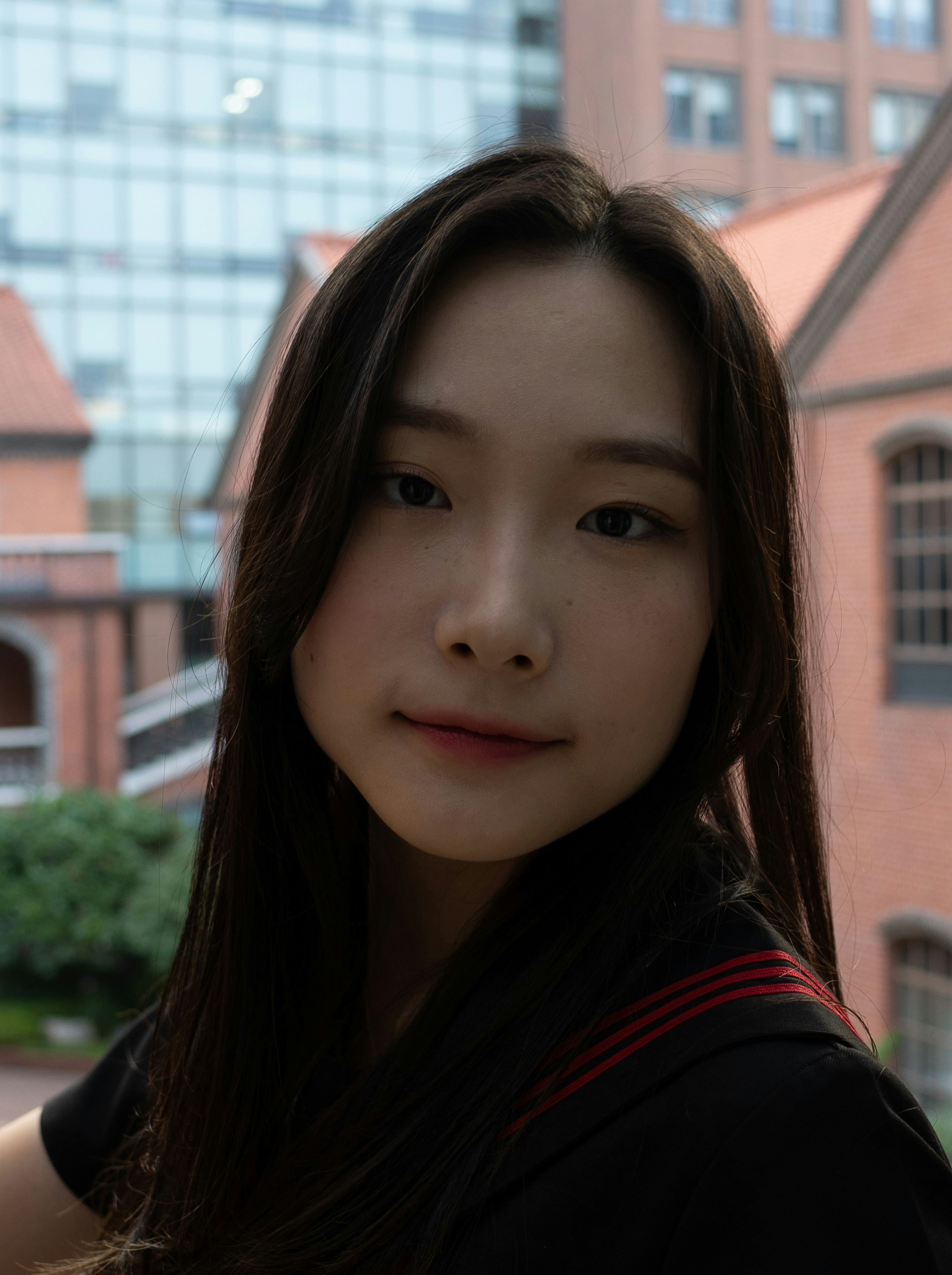 Soft Gaze in Brick-and-Glass: A Quiet City Portrait