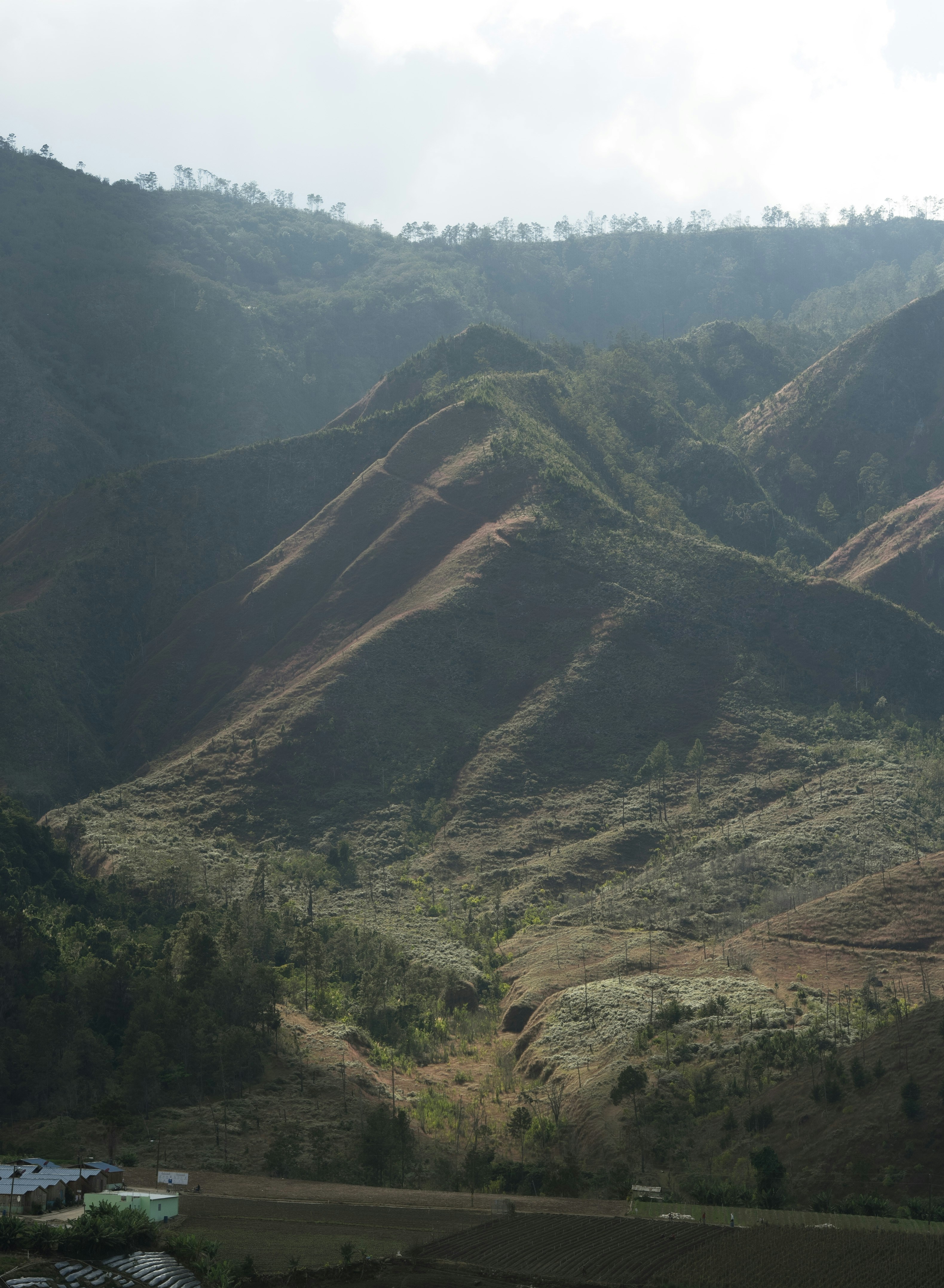 A view of a mountain range from a distance photo – Free Dominican ...