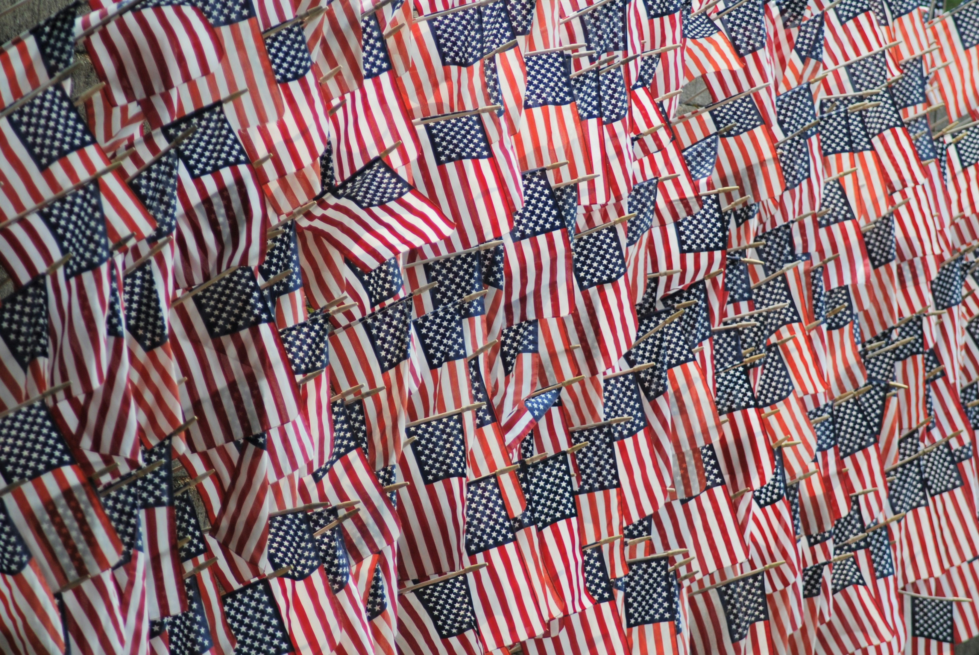 Flag Mosaic: a dense, overlapping tapestry of American banners