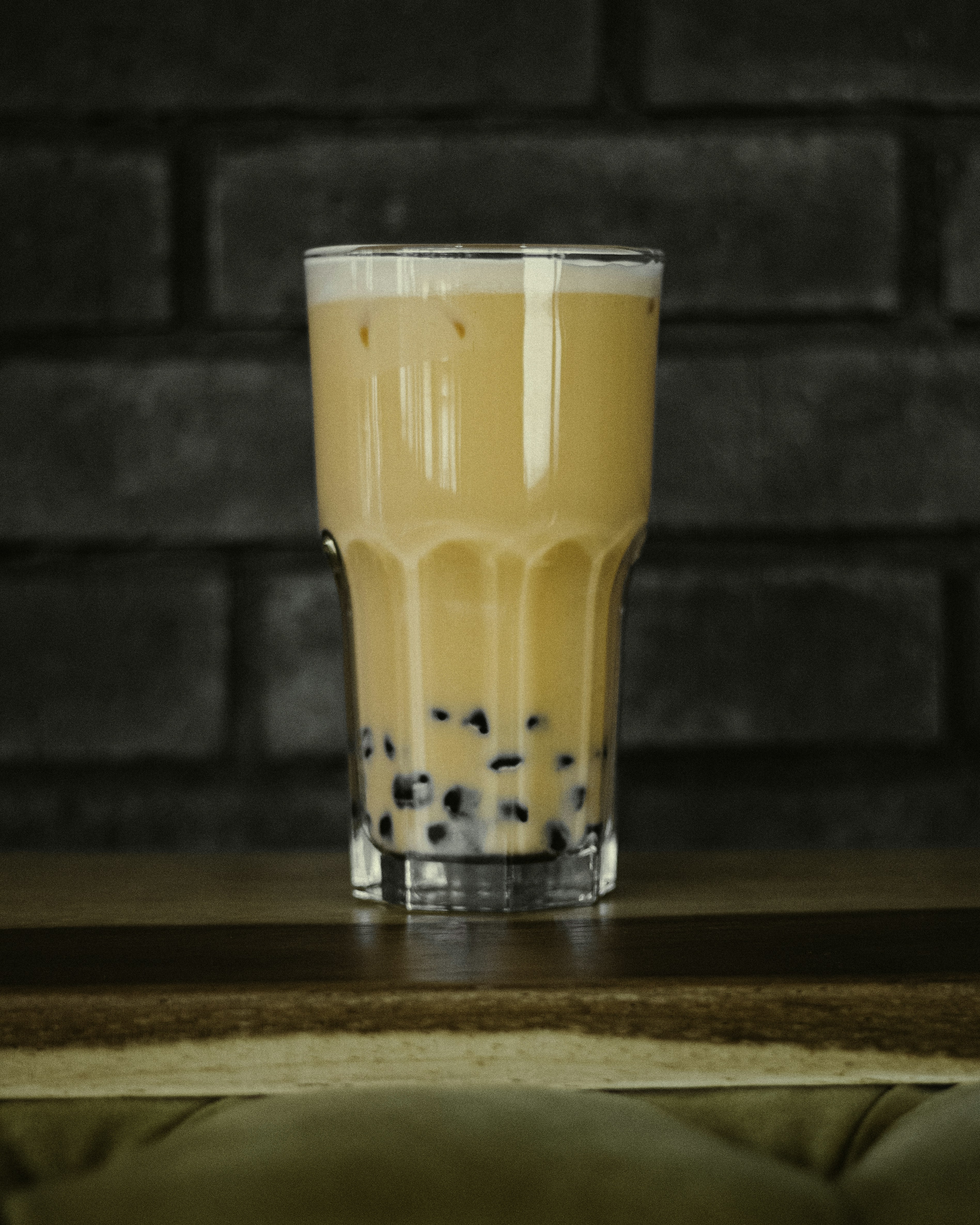 Creamy Foam, Dark Pearls: A Glass of Nighttime Pearl Milk Tea