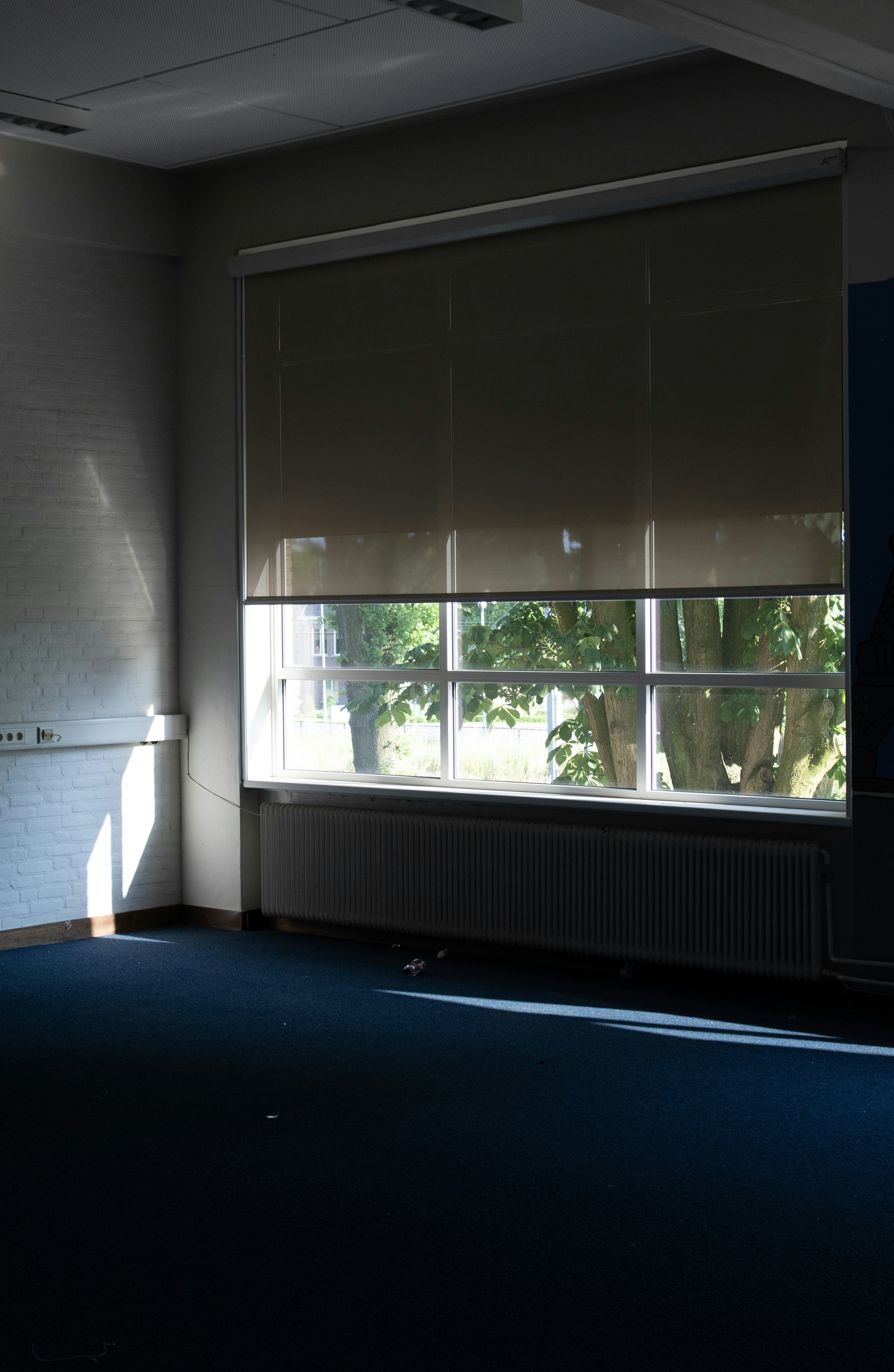 Striped Windowlight Crossing an Empty Room