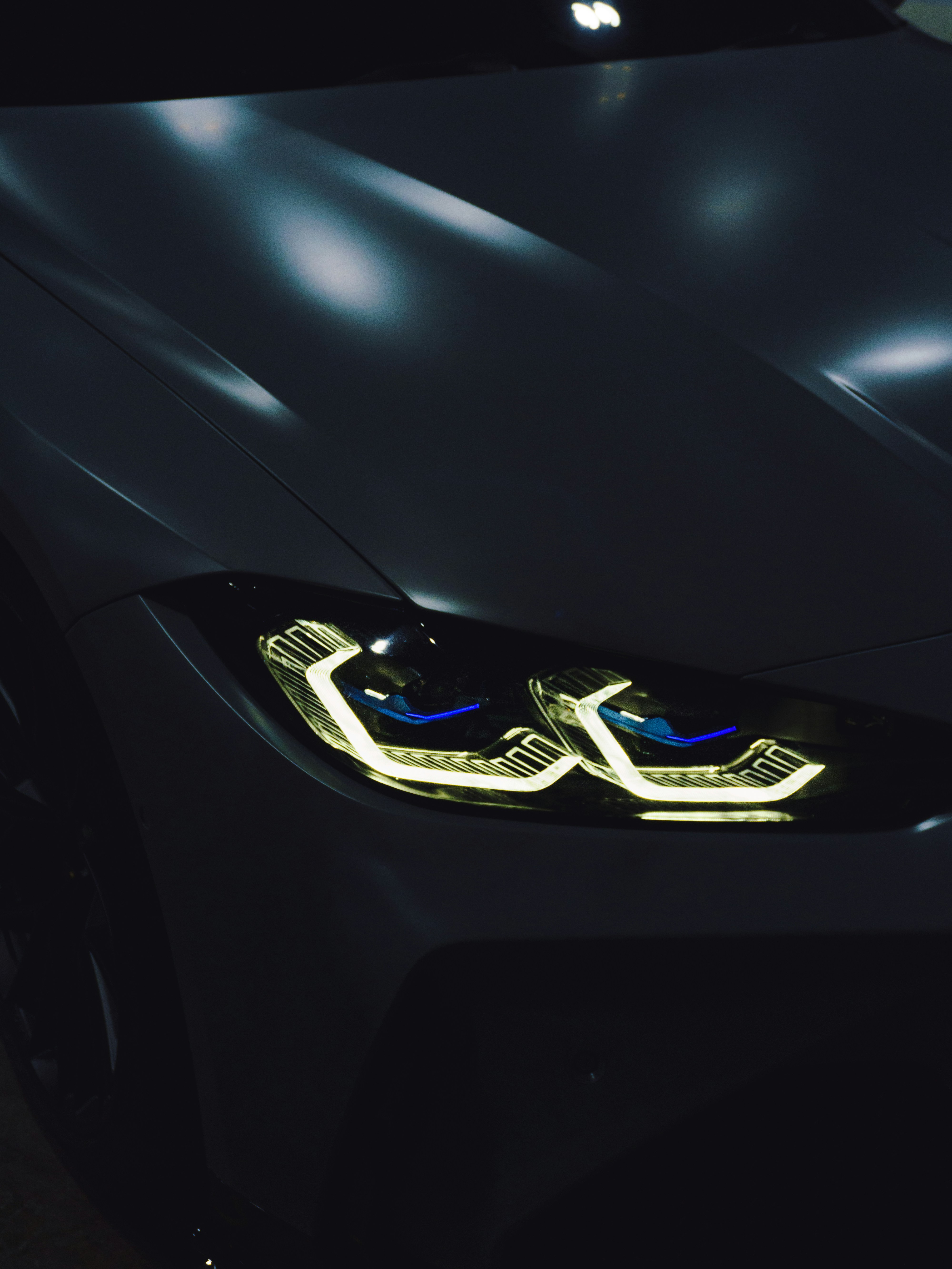 A close up of a car's headlights in the dark photo – Free Car wallpaper ...