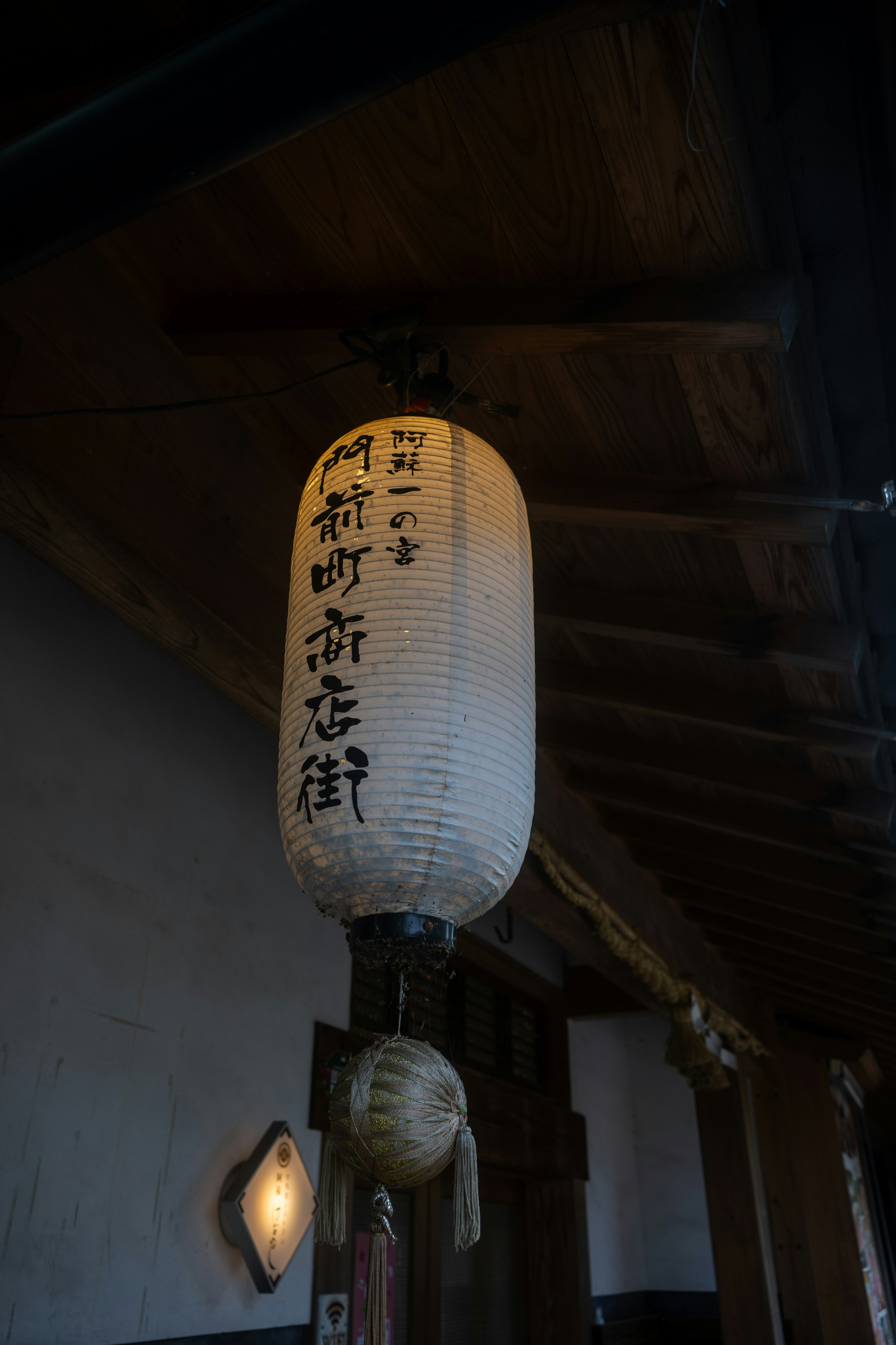 Lantern of Quiet Glow in a Timbered Japanese Hall