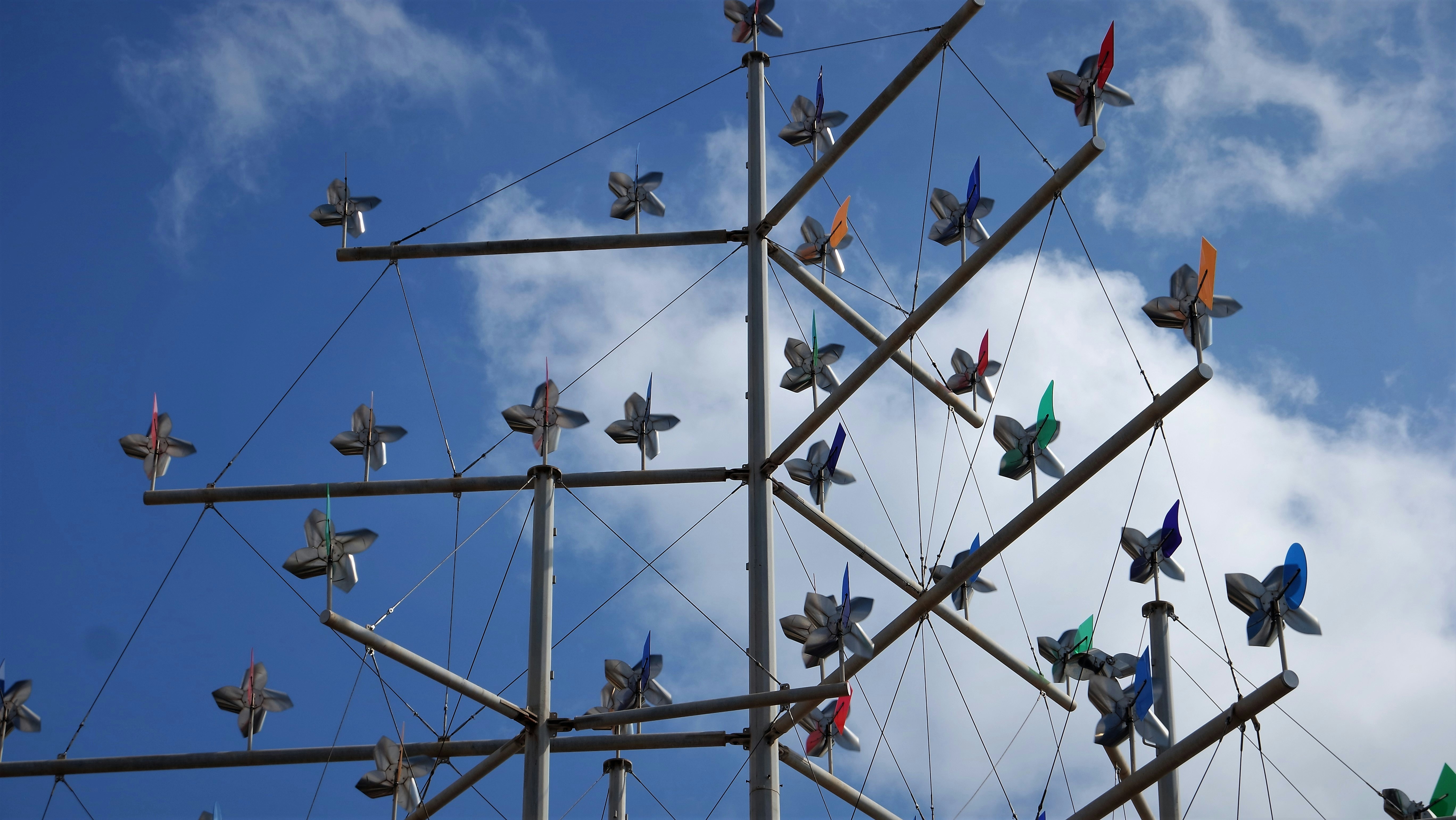 Chromatic Pinwheels on a Steel Constellation under Open Sky