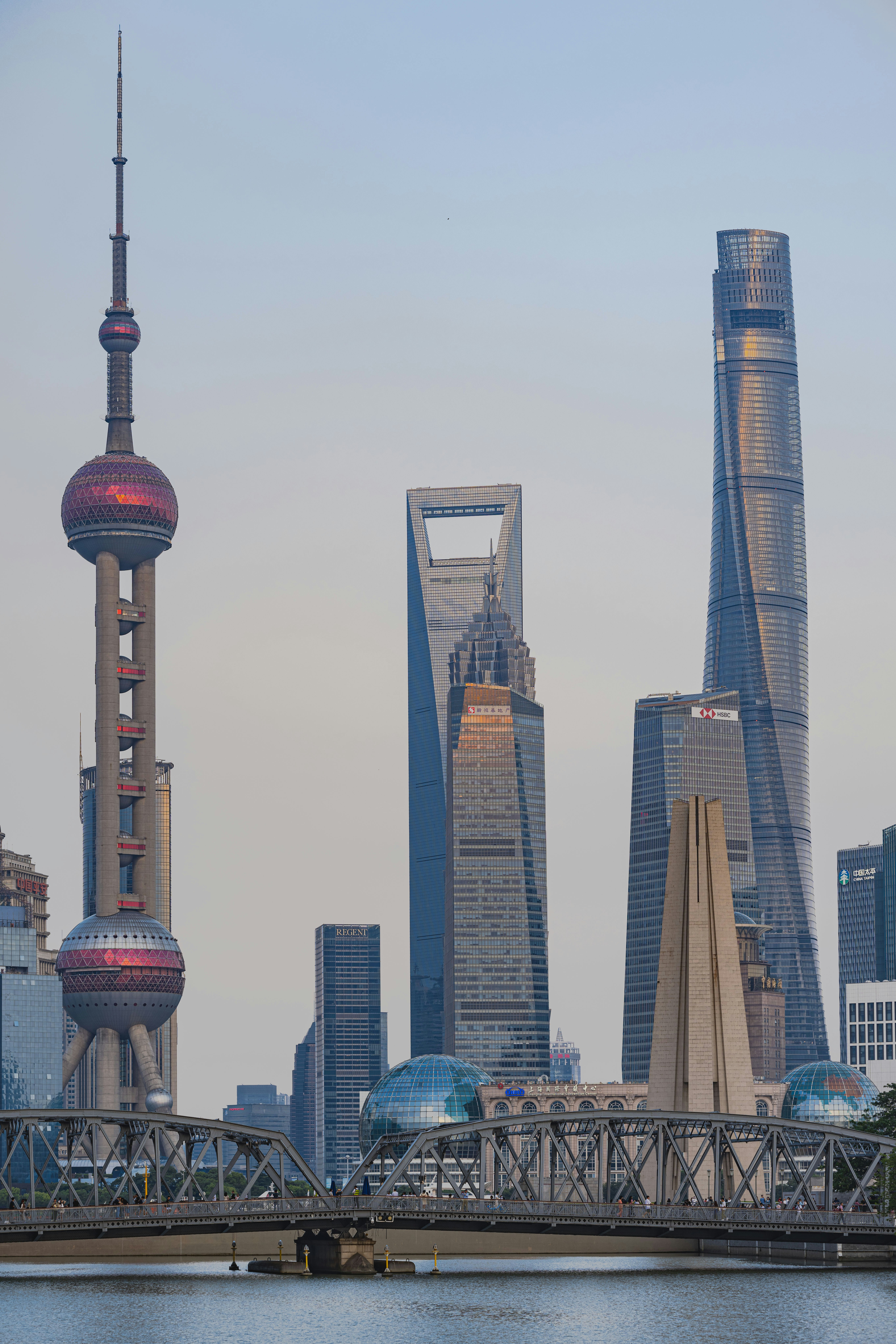 A view of a city with a bridge going across it photo – Free 中国 Image on ...