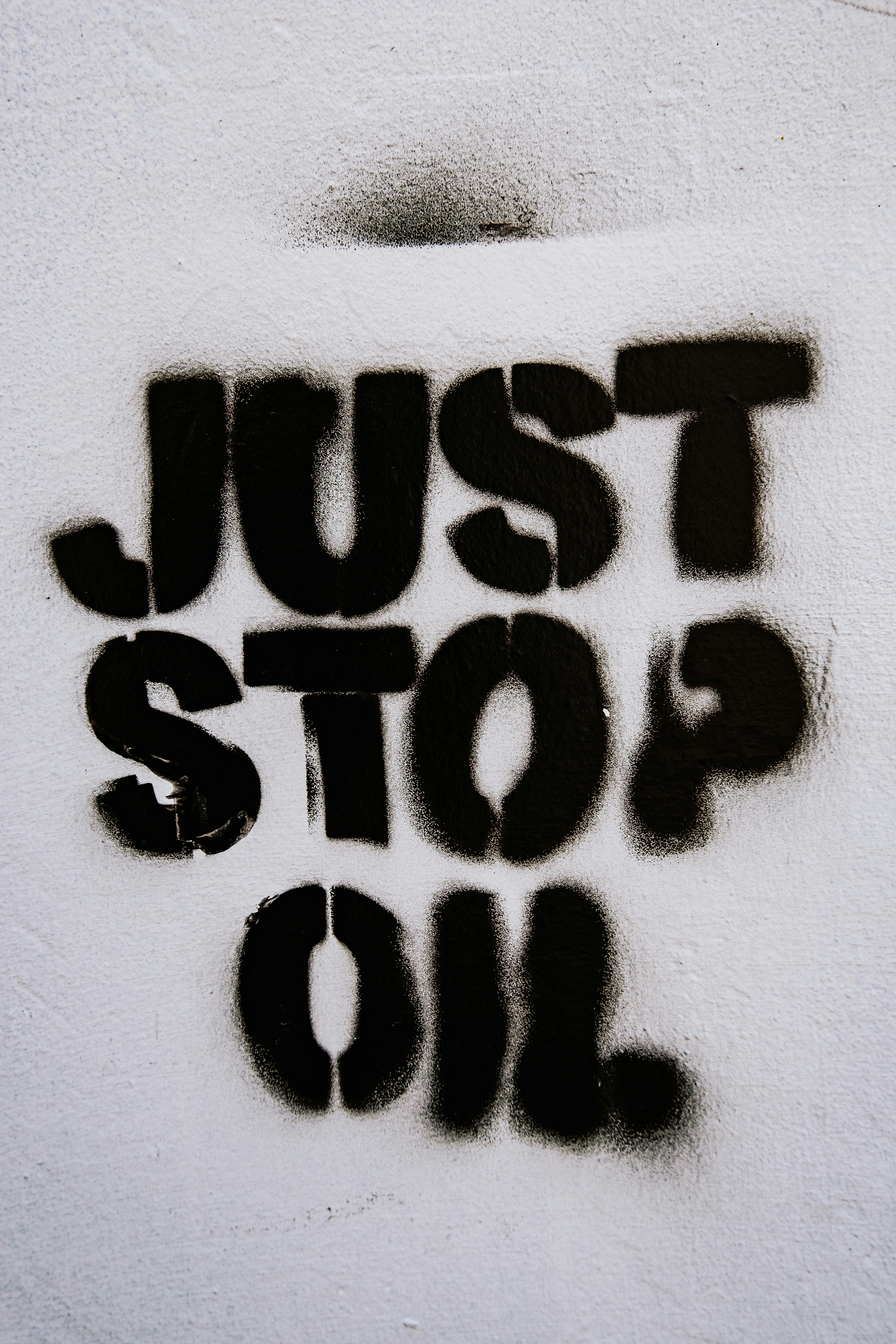 A spray painted sign that says just stop oil photo – Free Current ...