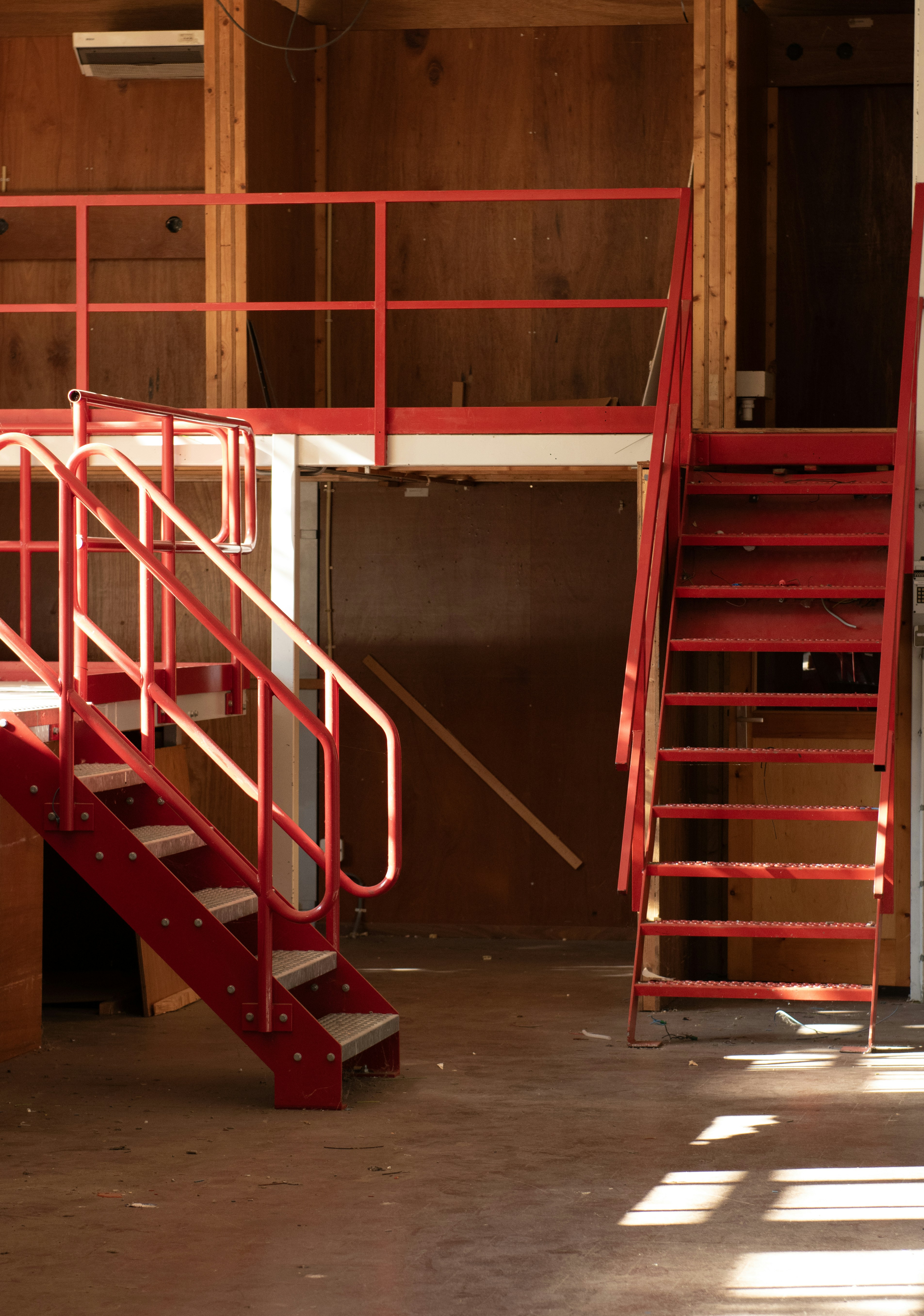 A red stair case next to a set of stairs photo – Free Netherlands Image ...