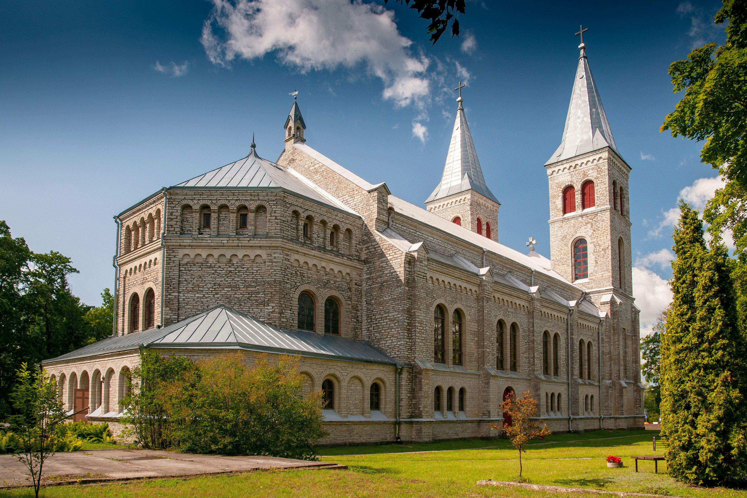 A large building with two towers and two spires photo – Free Arch Image ...