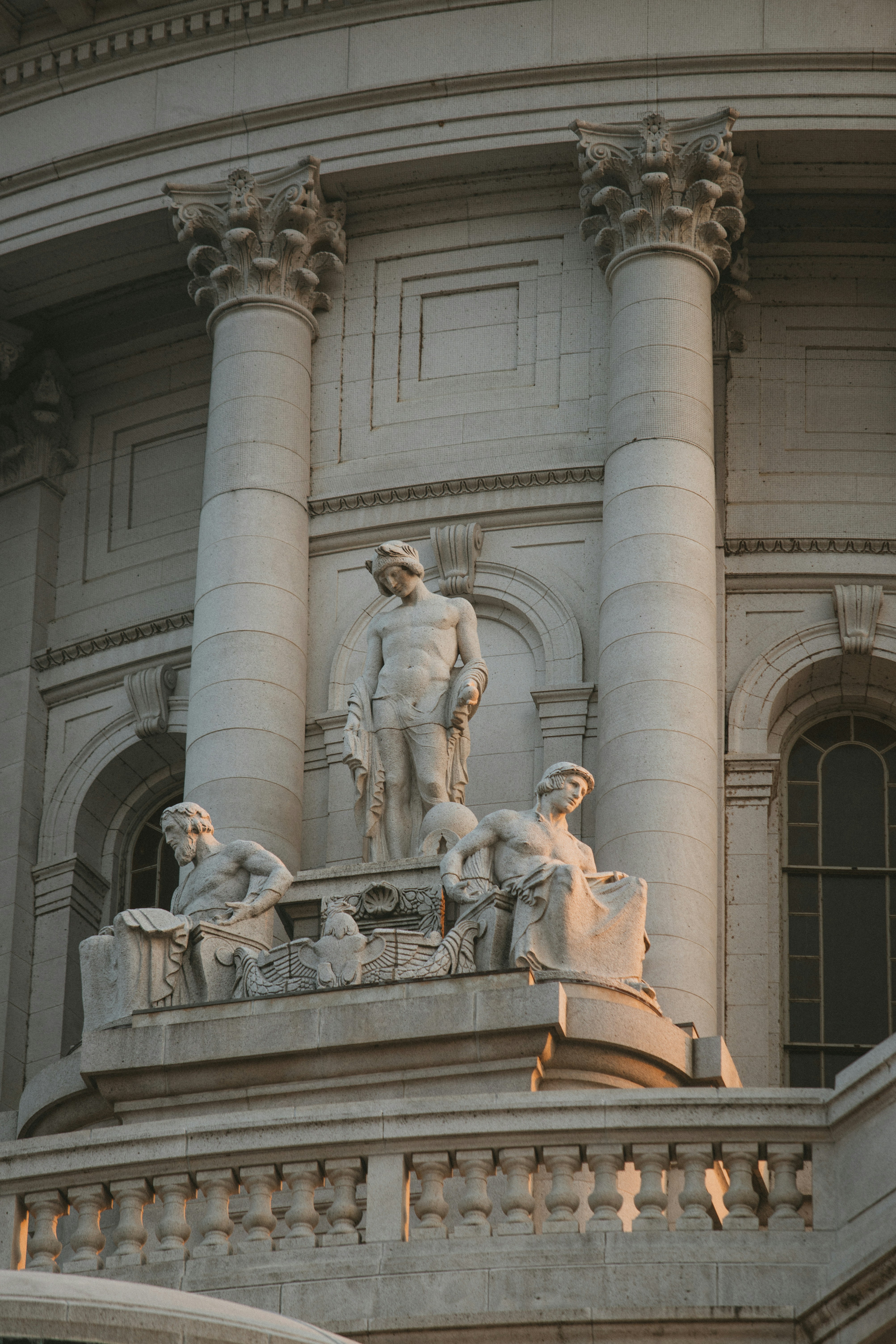 A large building with statues on top of it photo – Free Madison Image ...