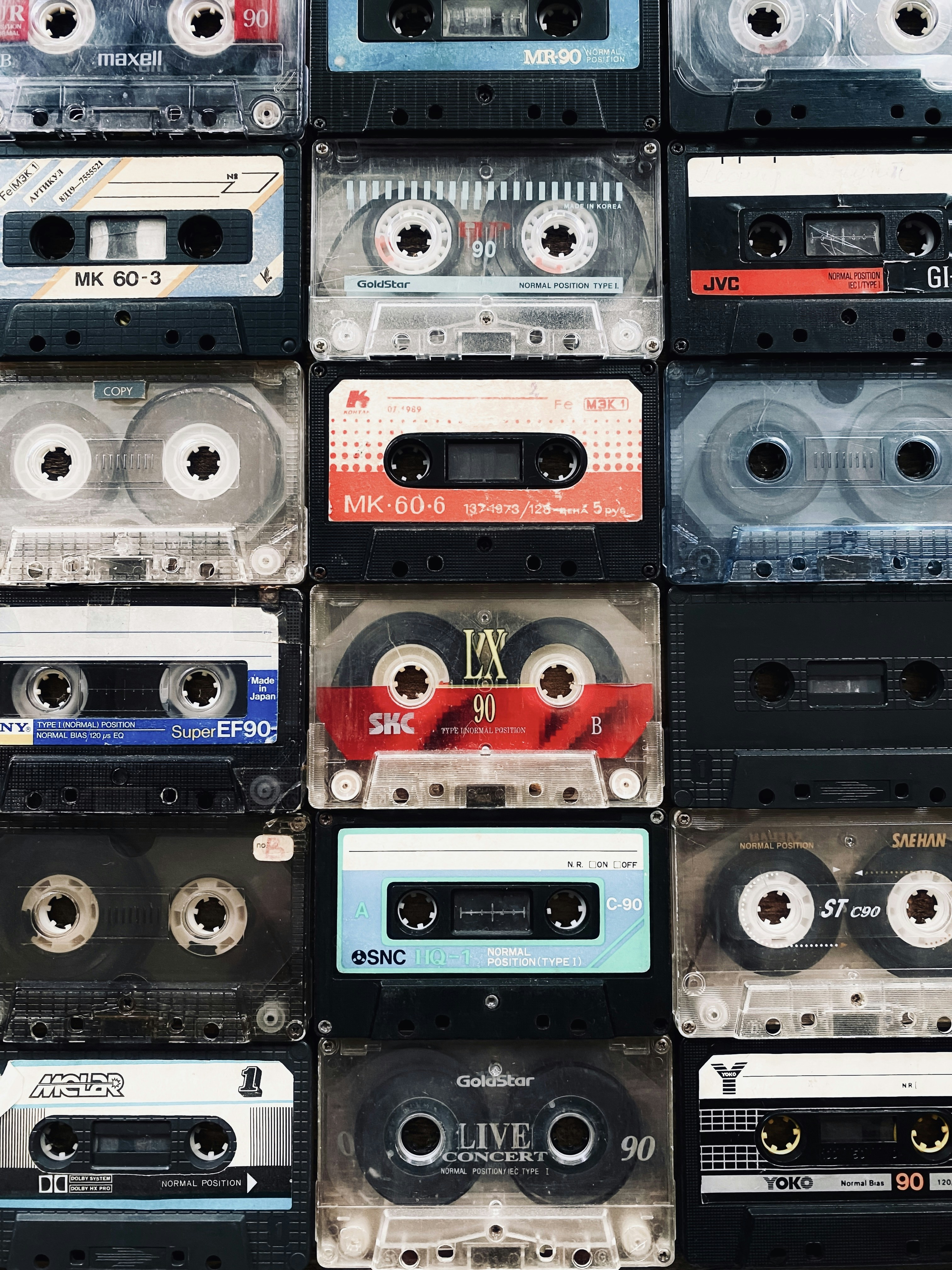 A bunch of cassettes stacked on top of each other photo – Free Cassette ...