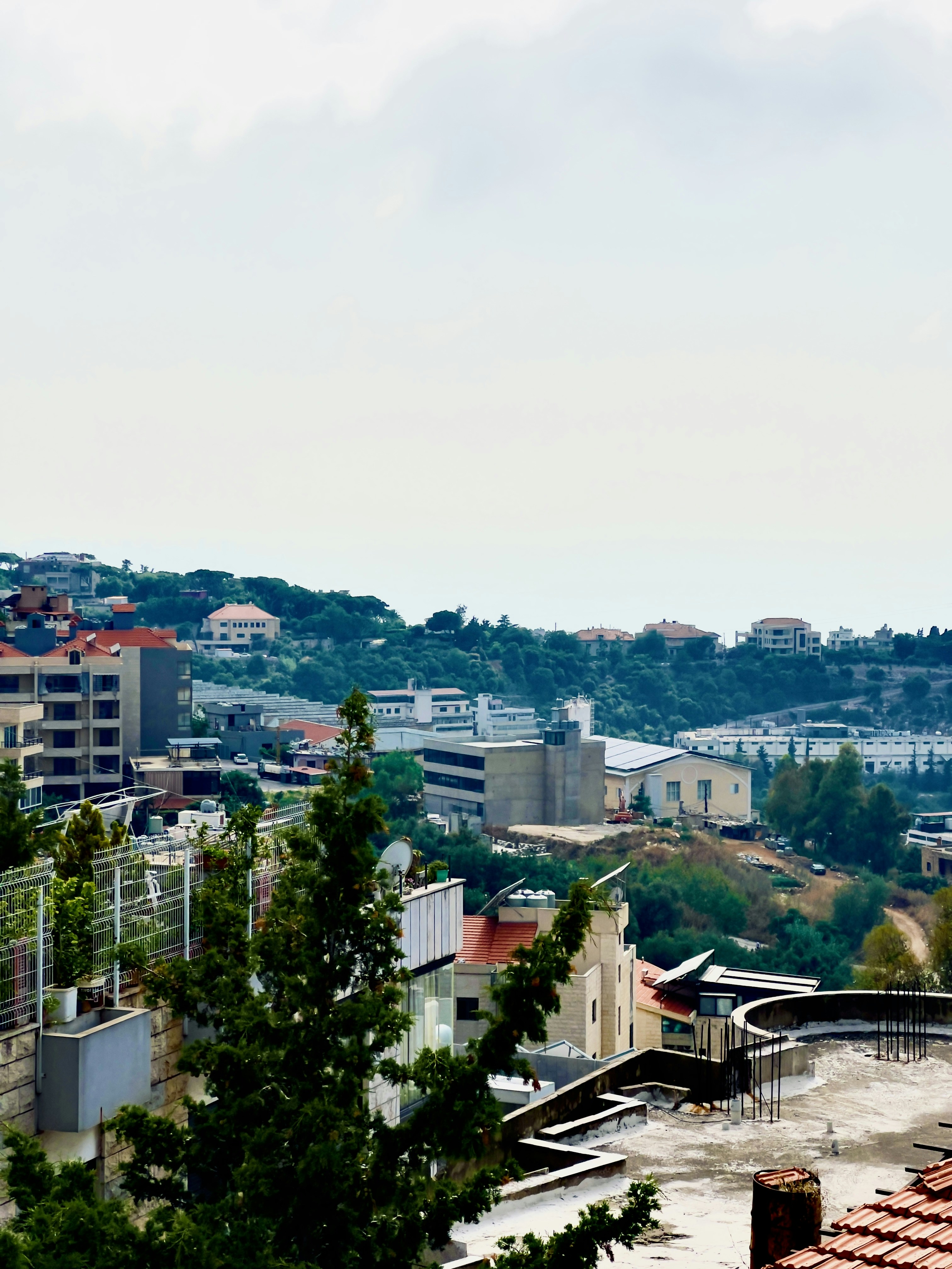 Terraced Rooftops on a Sunlit Ridge