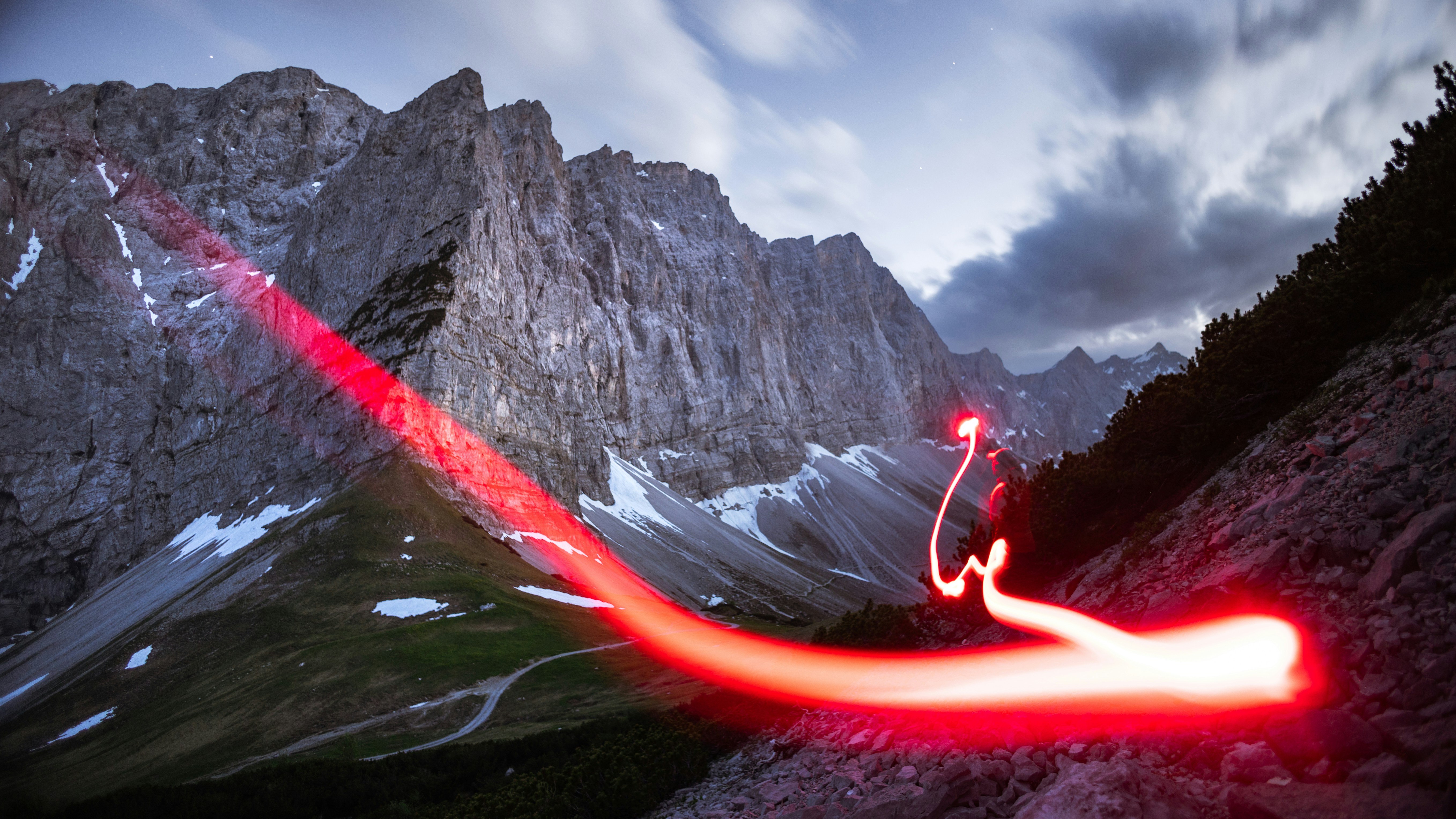 Red Light Serenade Over Sharp Alpine Ridges