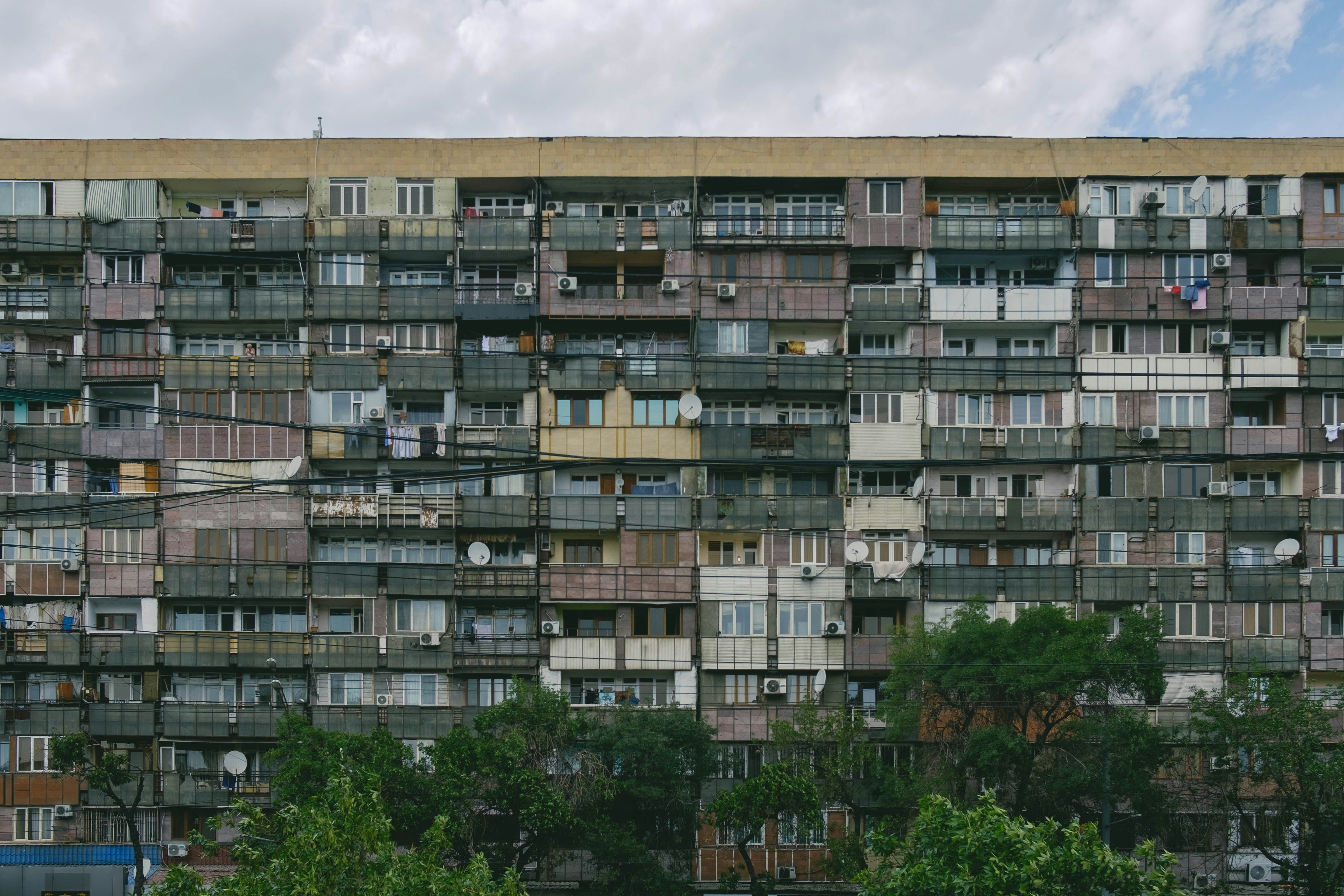Concrete Mosaic: The Tangle of Balconies in a City Block