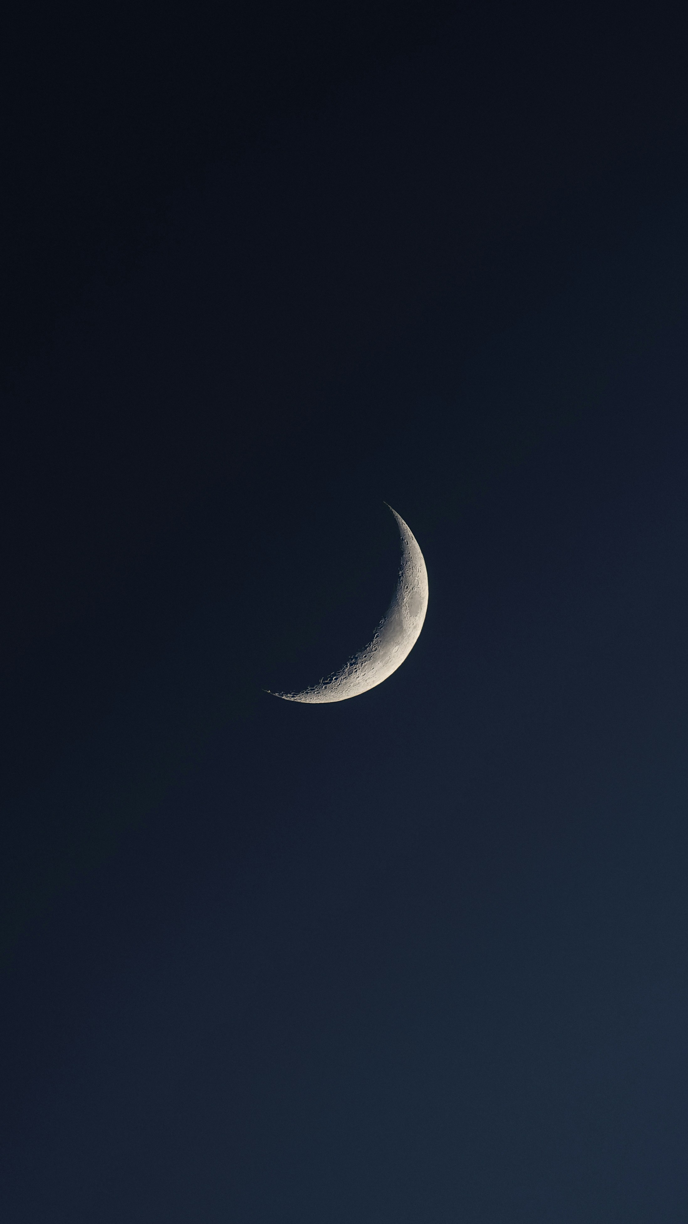 A crescent moon in a dark blue sky photo – Free Backgrounds Image on ...