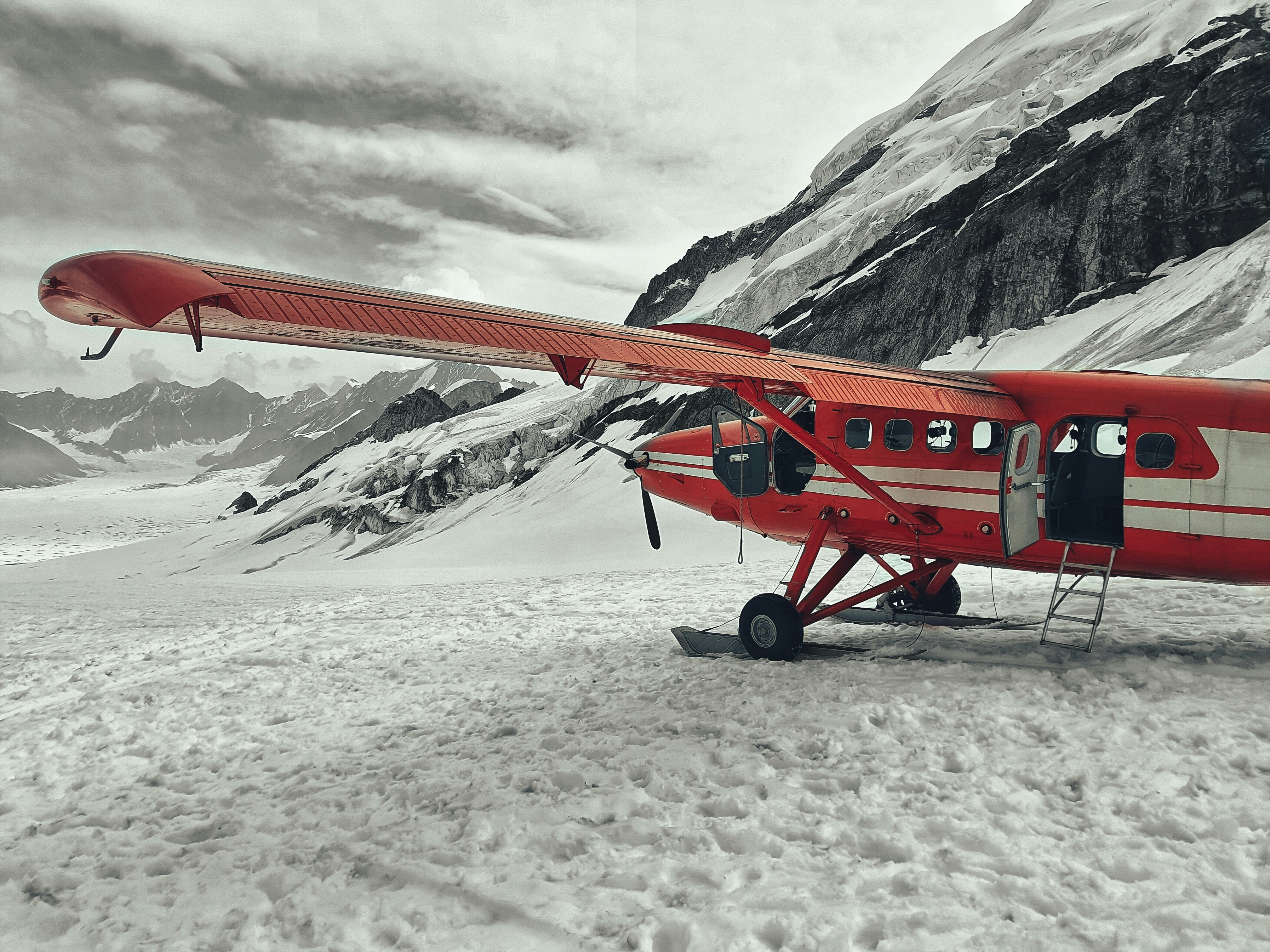 Red Wings on White Silence: A Snowbound Expedition Plane